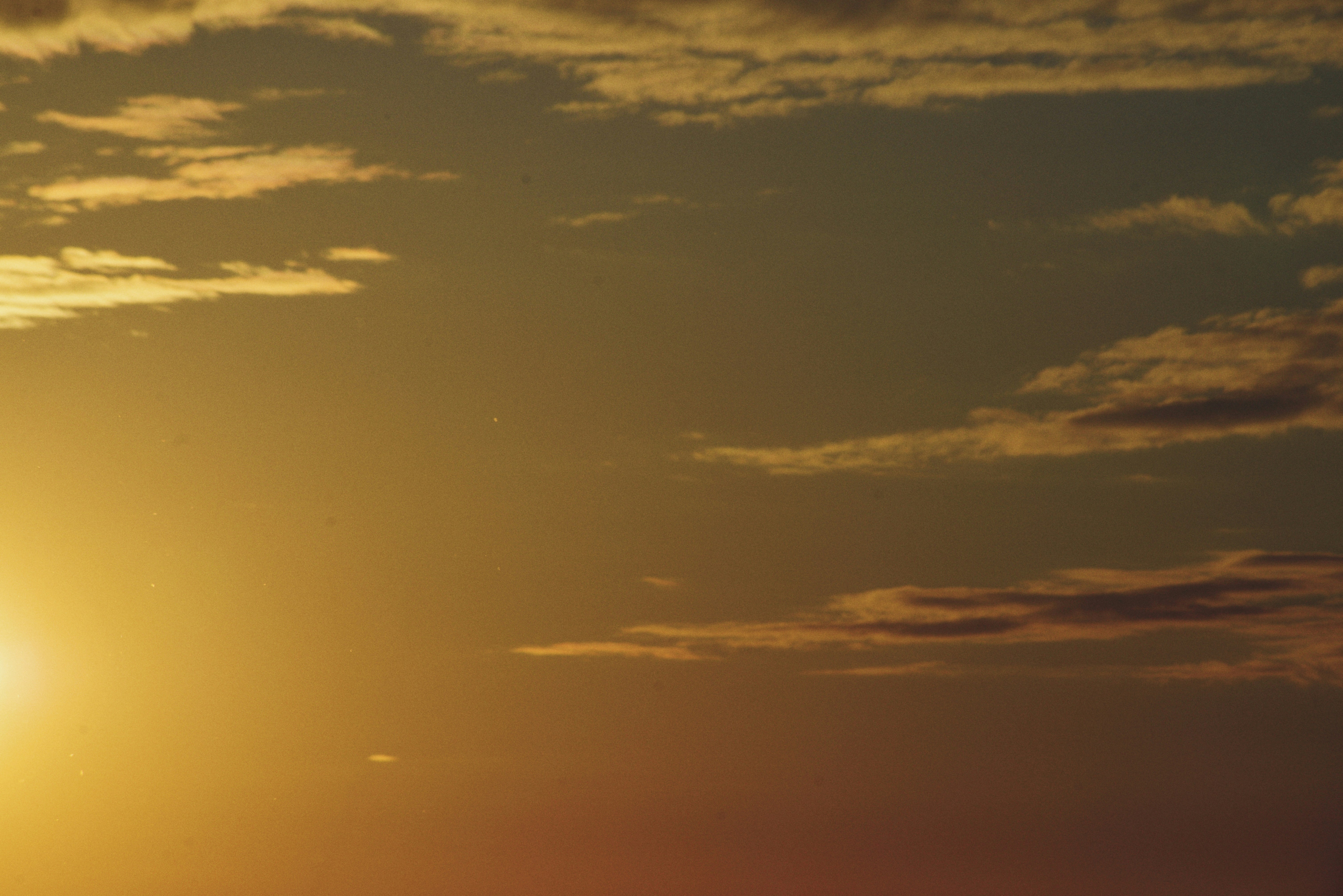 Soft Horizon Fire: A Golden Sunset Embers the Sky