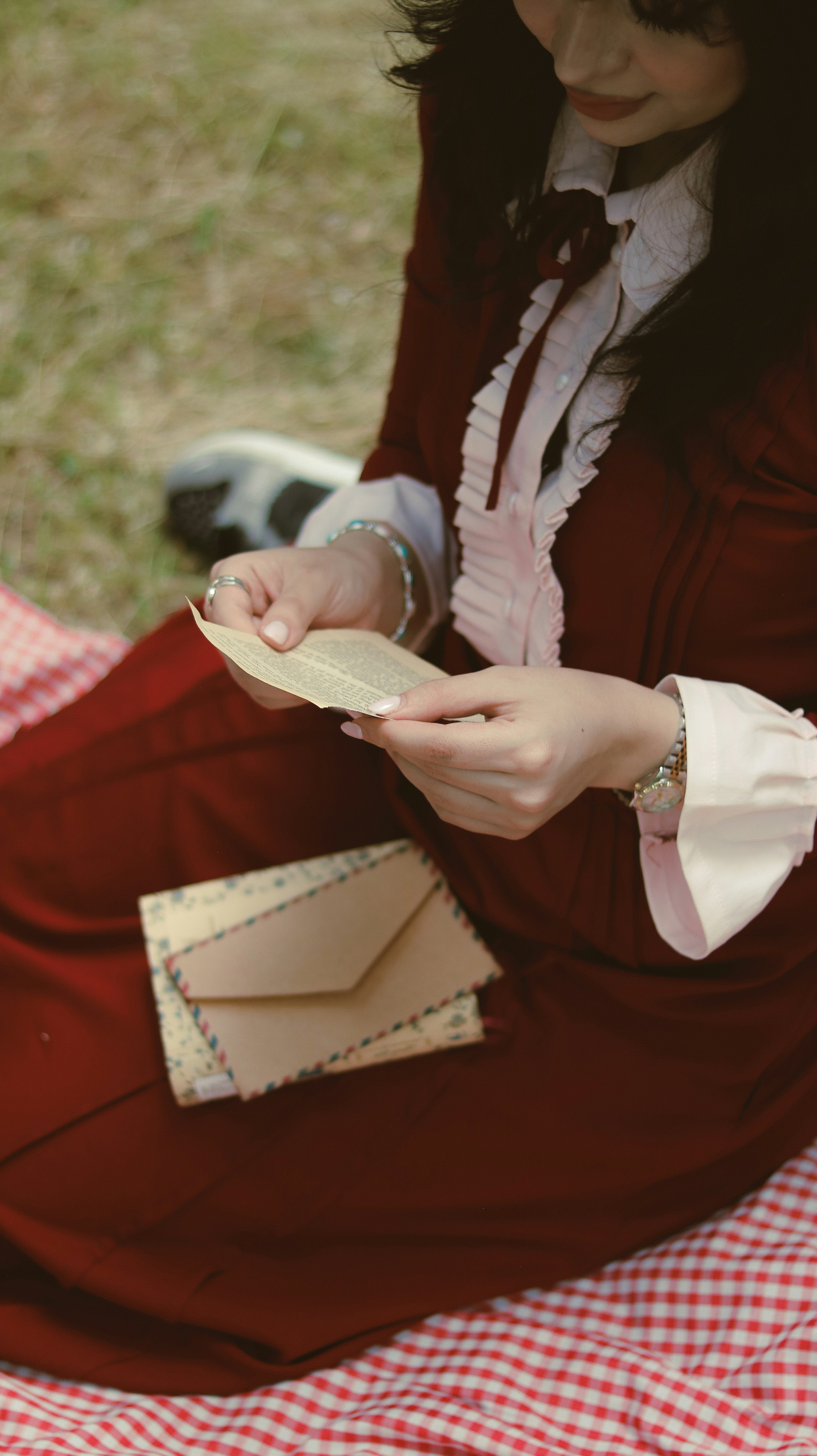 Quiet Moment in Red Velvet: A Letter Read Under Patchwork Sky