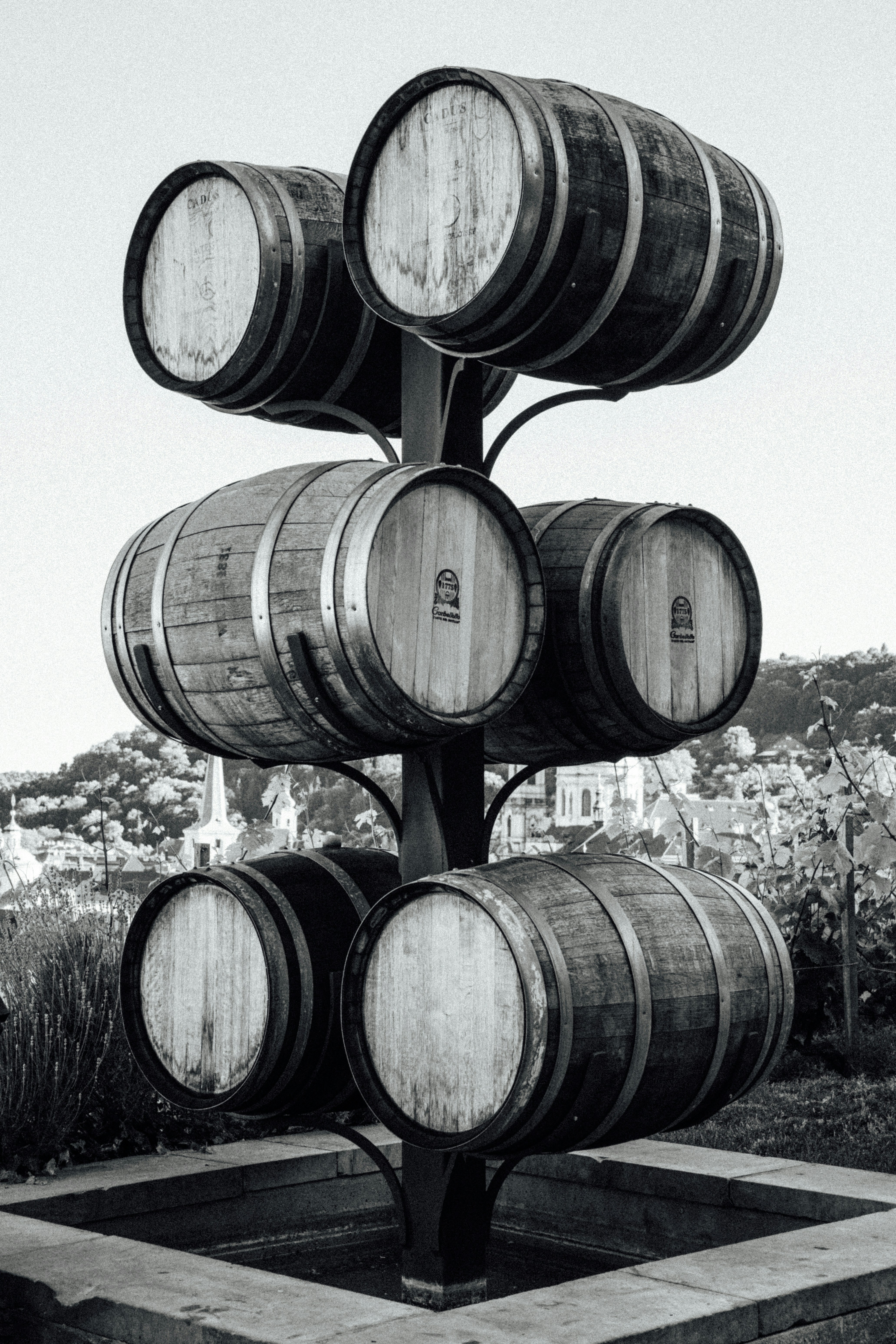 Stacked Oak: A Monument to Time on a Barrel Stand