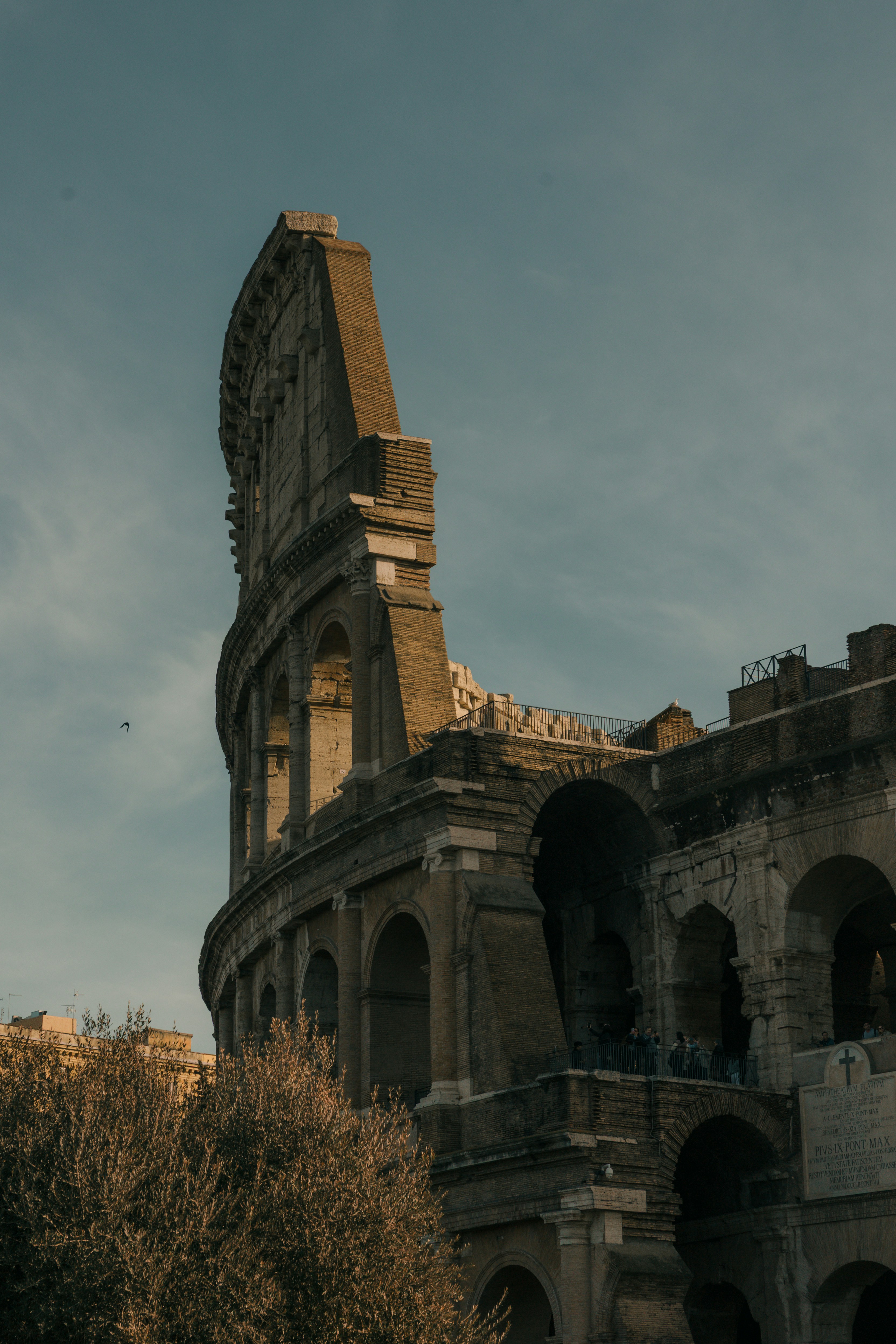 Colosseum Twilight: Time-Worn Arches Reaching Toward a Quiet Sky