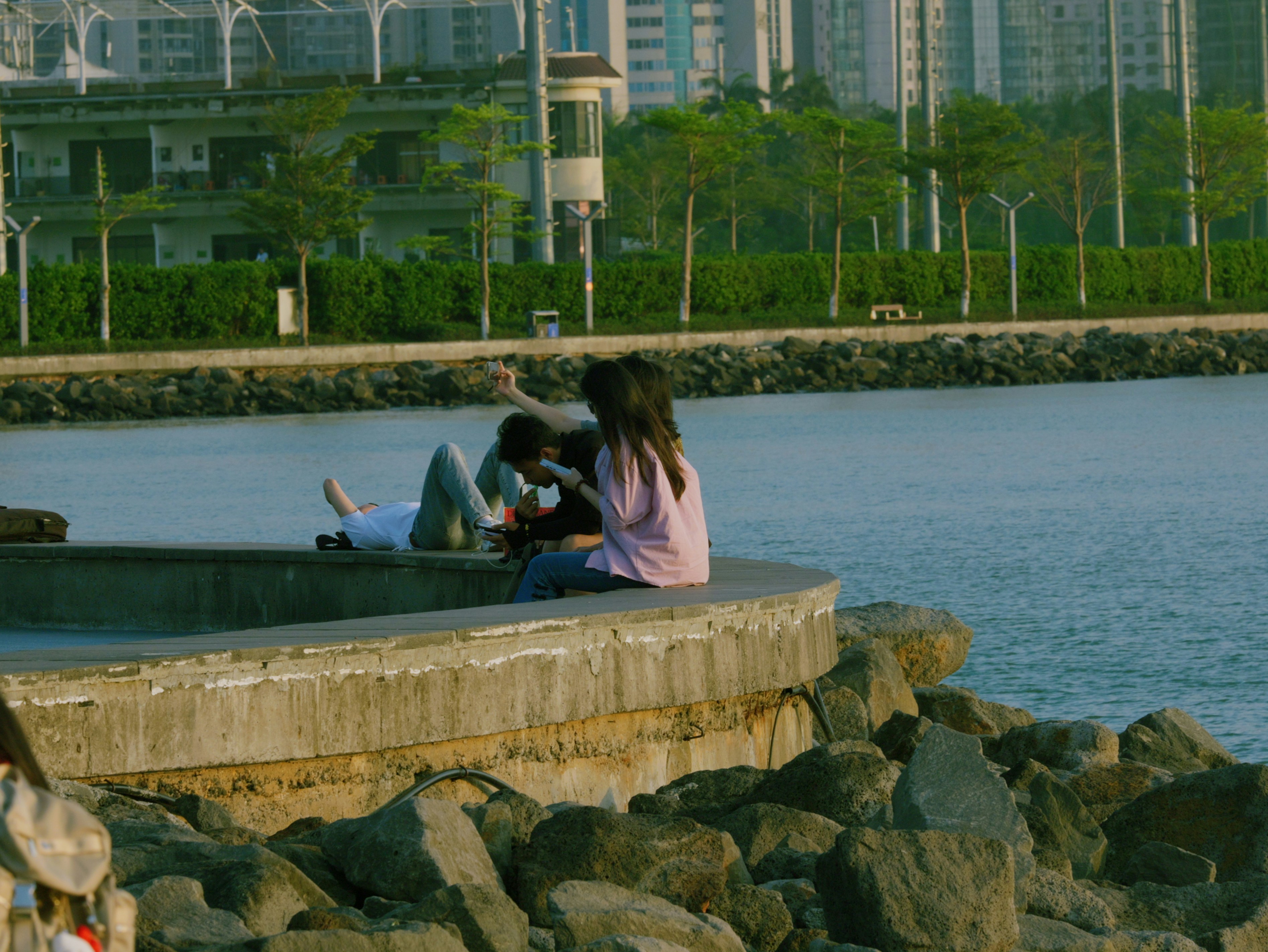 Sunlit City by the Pier: Friends and Water