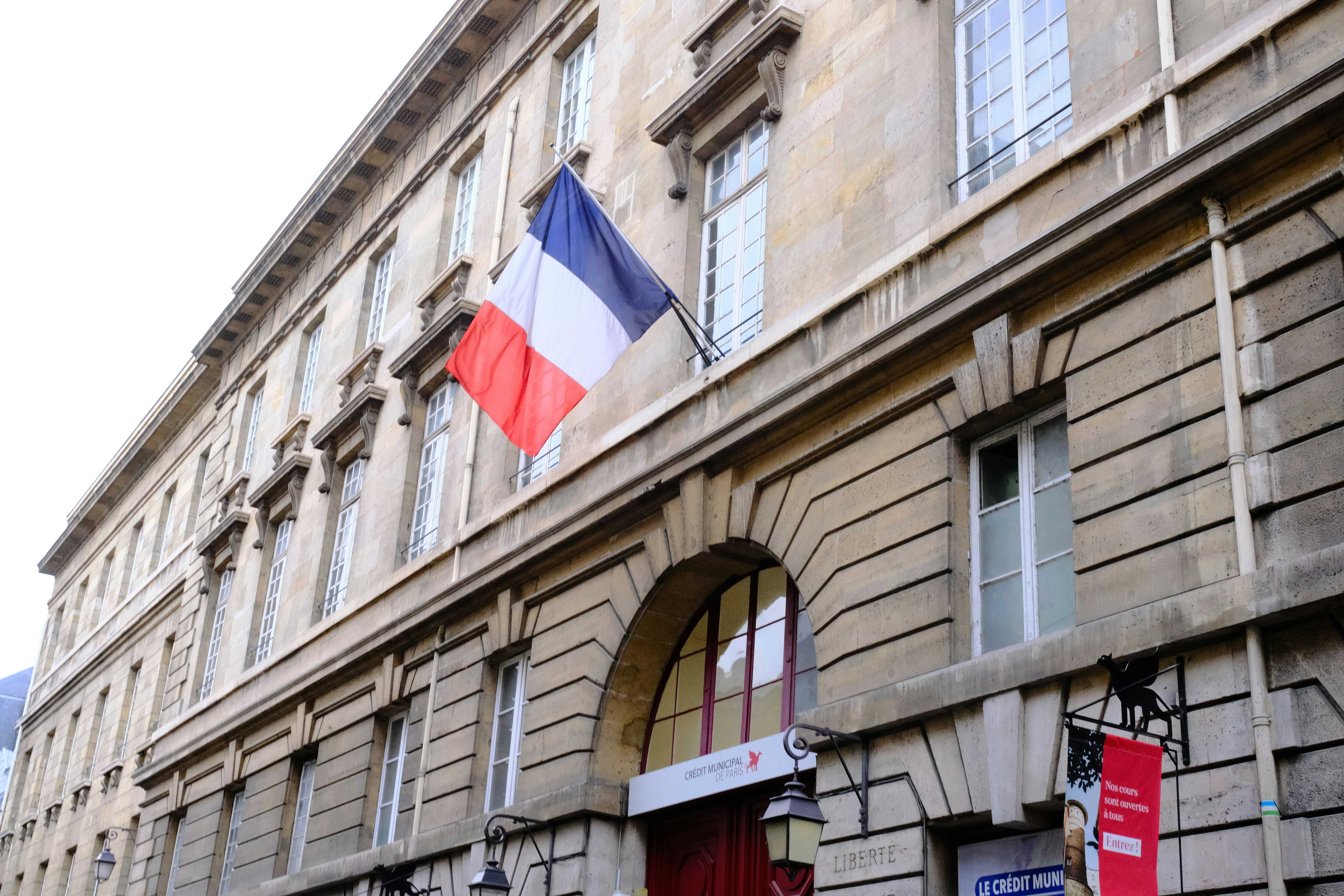 Flag Over an Elegant Parisian Facade