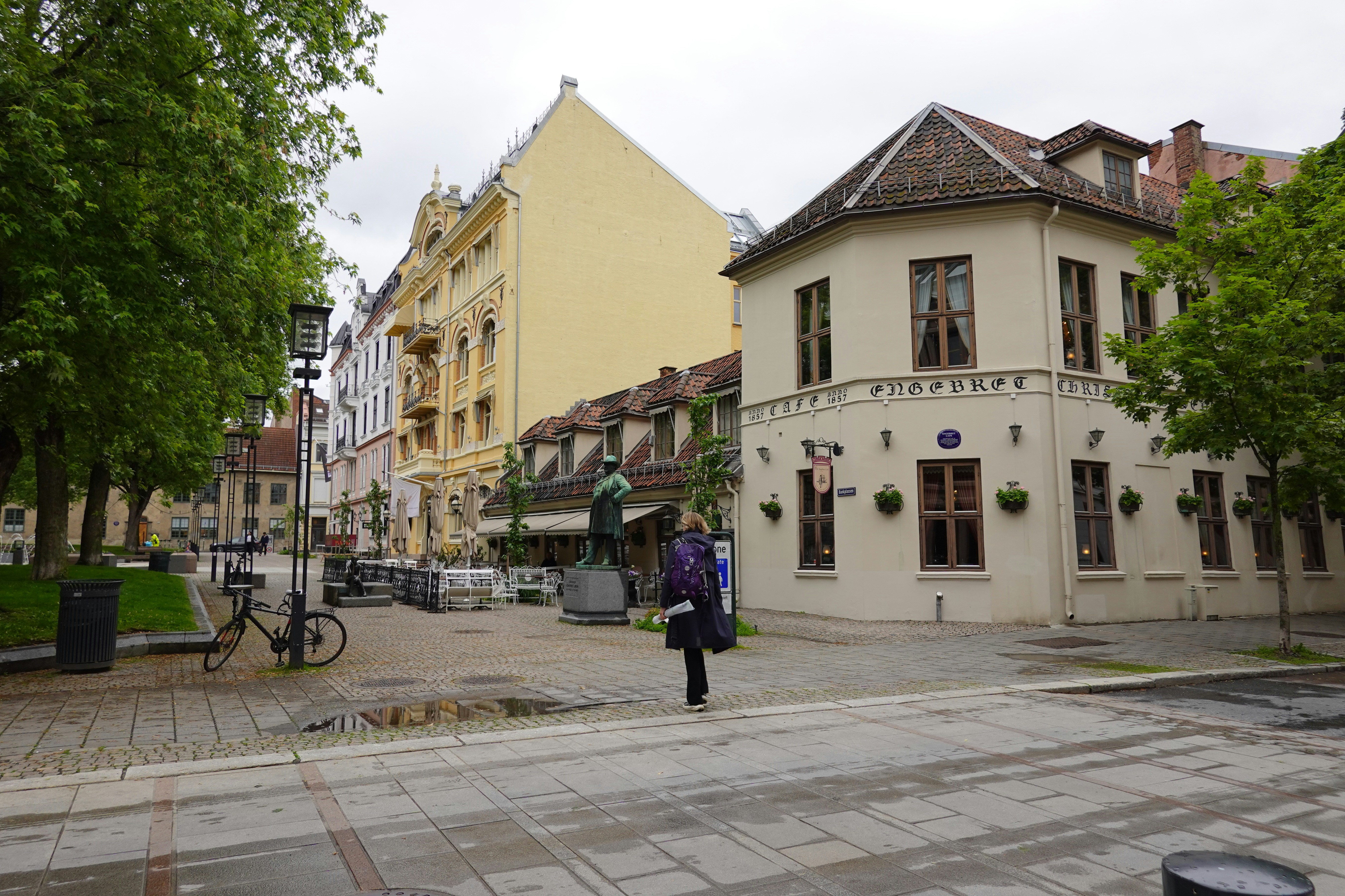 Quiet Street Corner with Historic Corner Building and Statue