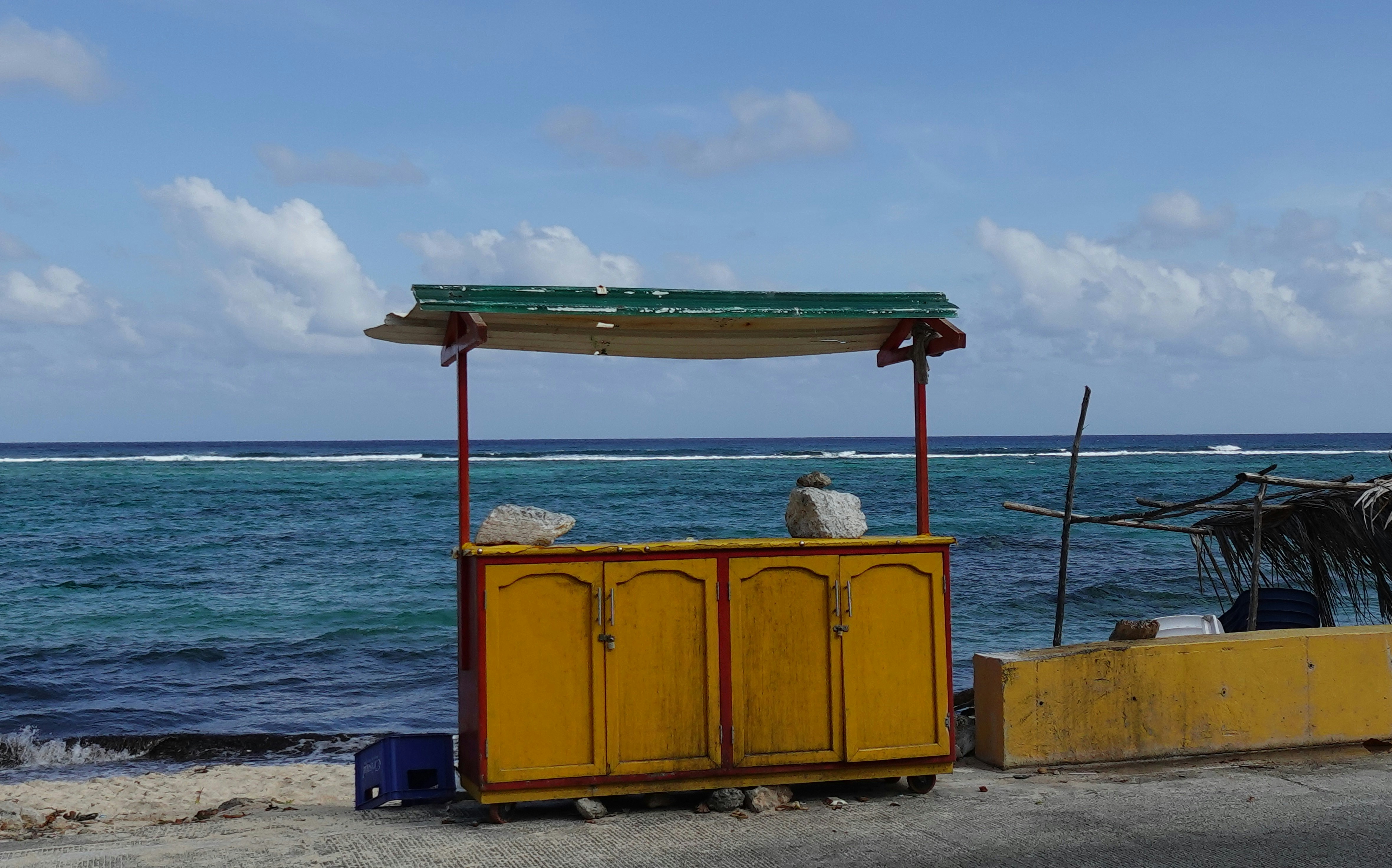 Yellow Beach Kiosk by the Turquoise Sea