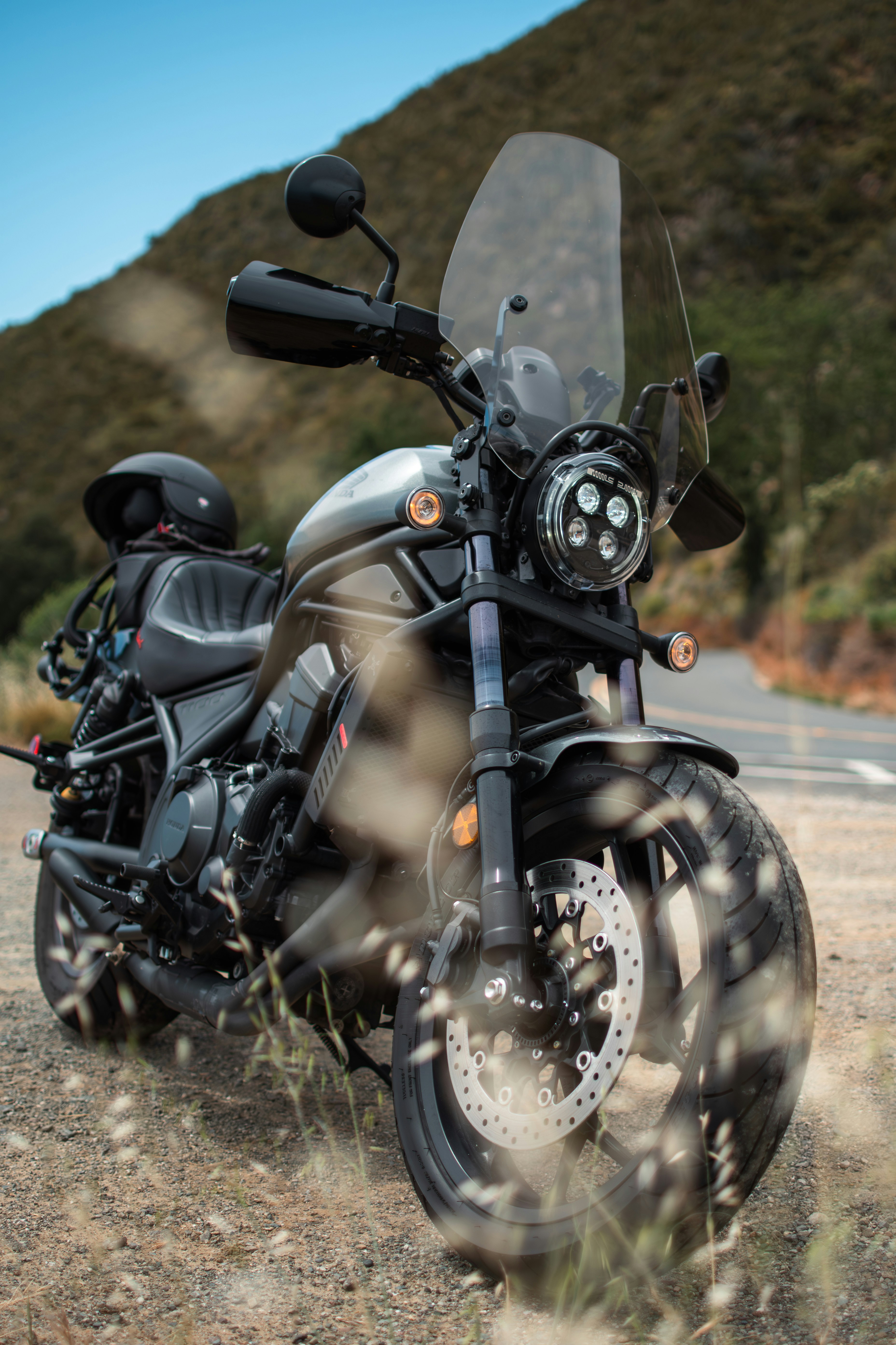 Front-Quarter Majesty: A Black Adventure Bike Anchored by a Broad Windshield