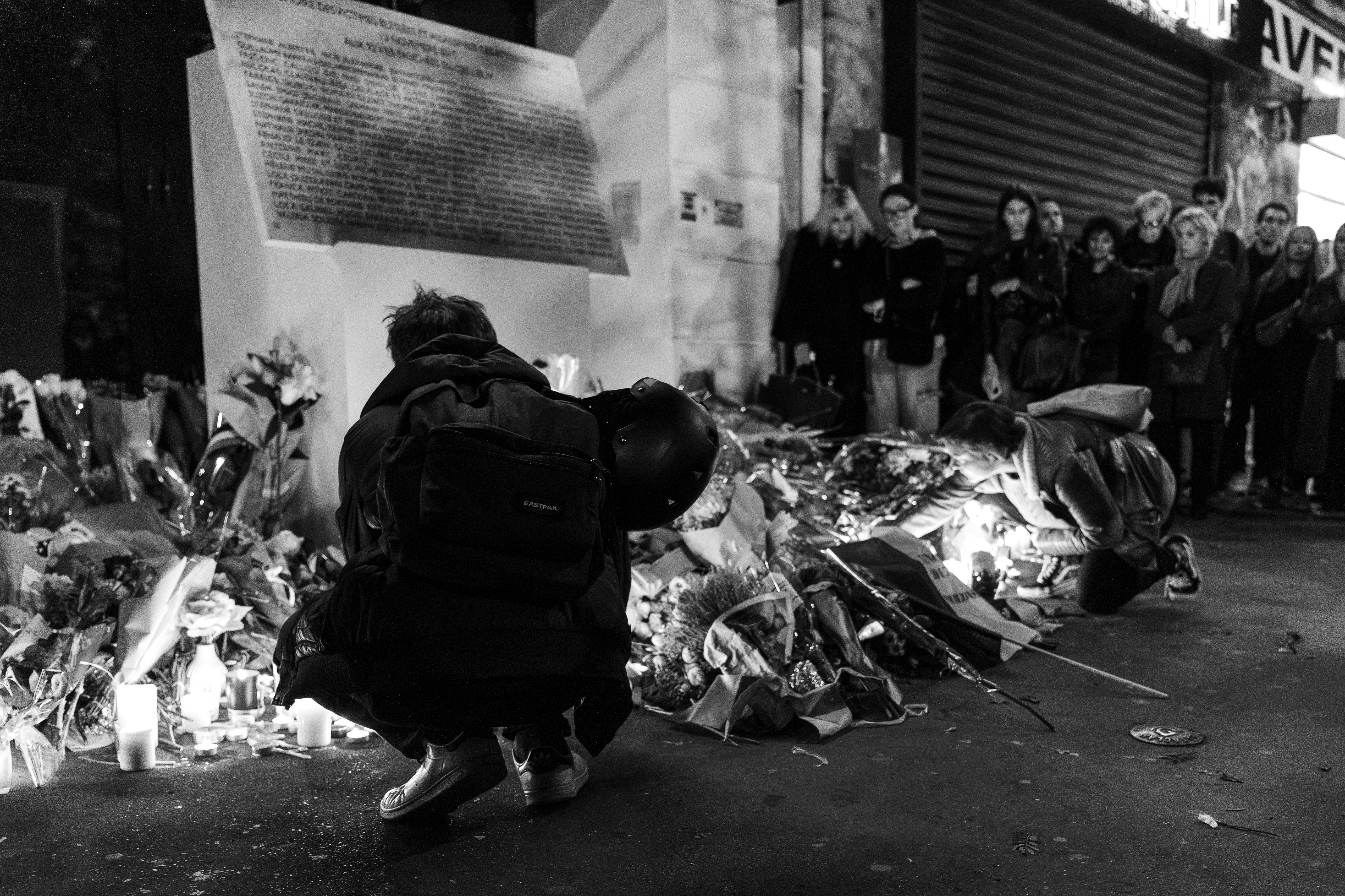 Candlelit Vigil Before a Monument: Anonymity and Solace
