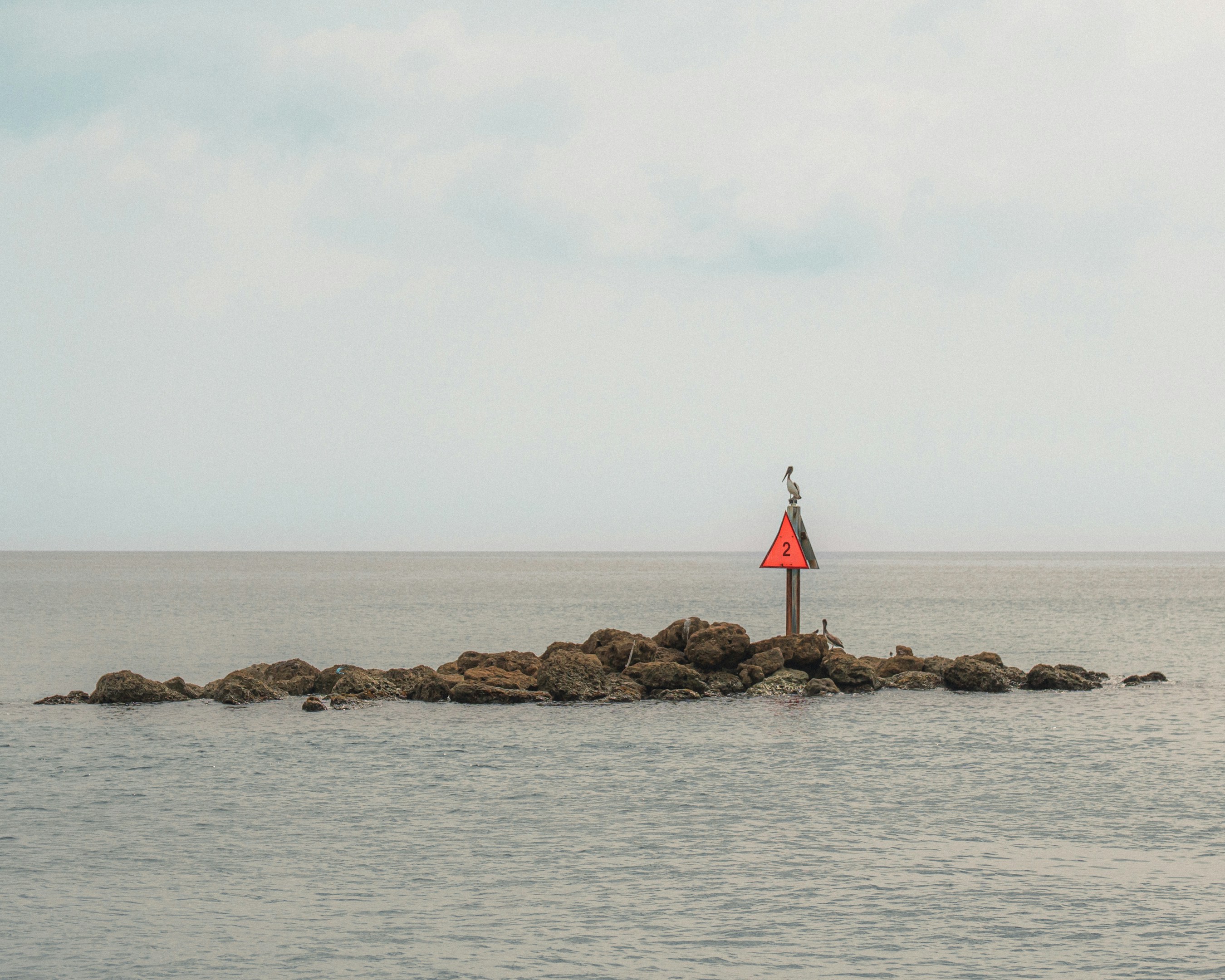 Red Buoy at the Quiet Breakwater