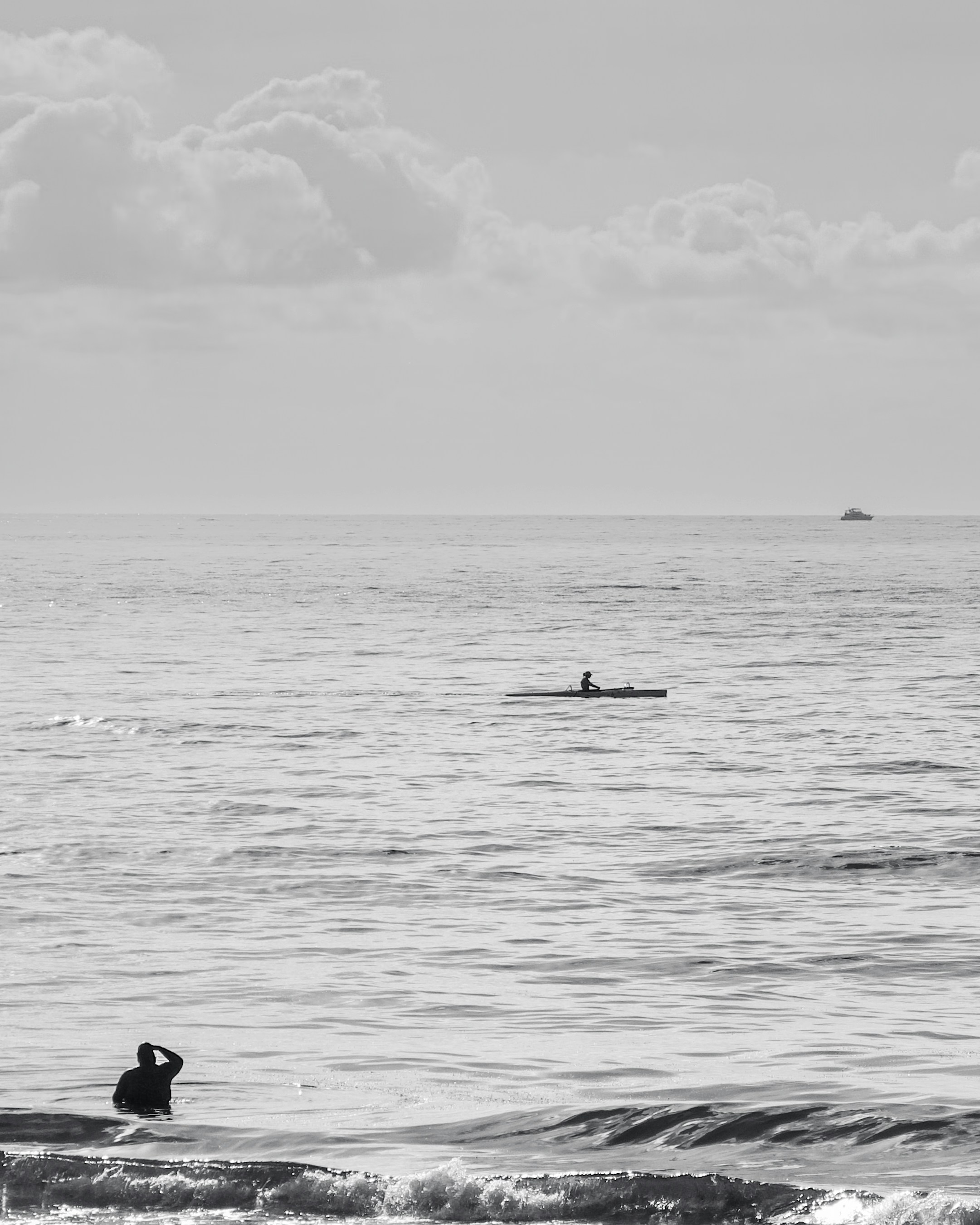 Lonely Surfer below a Quiet Horizon