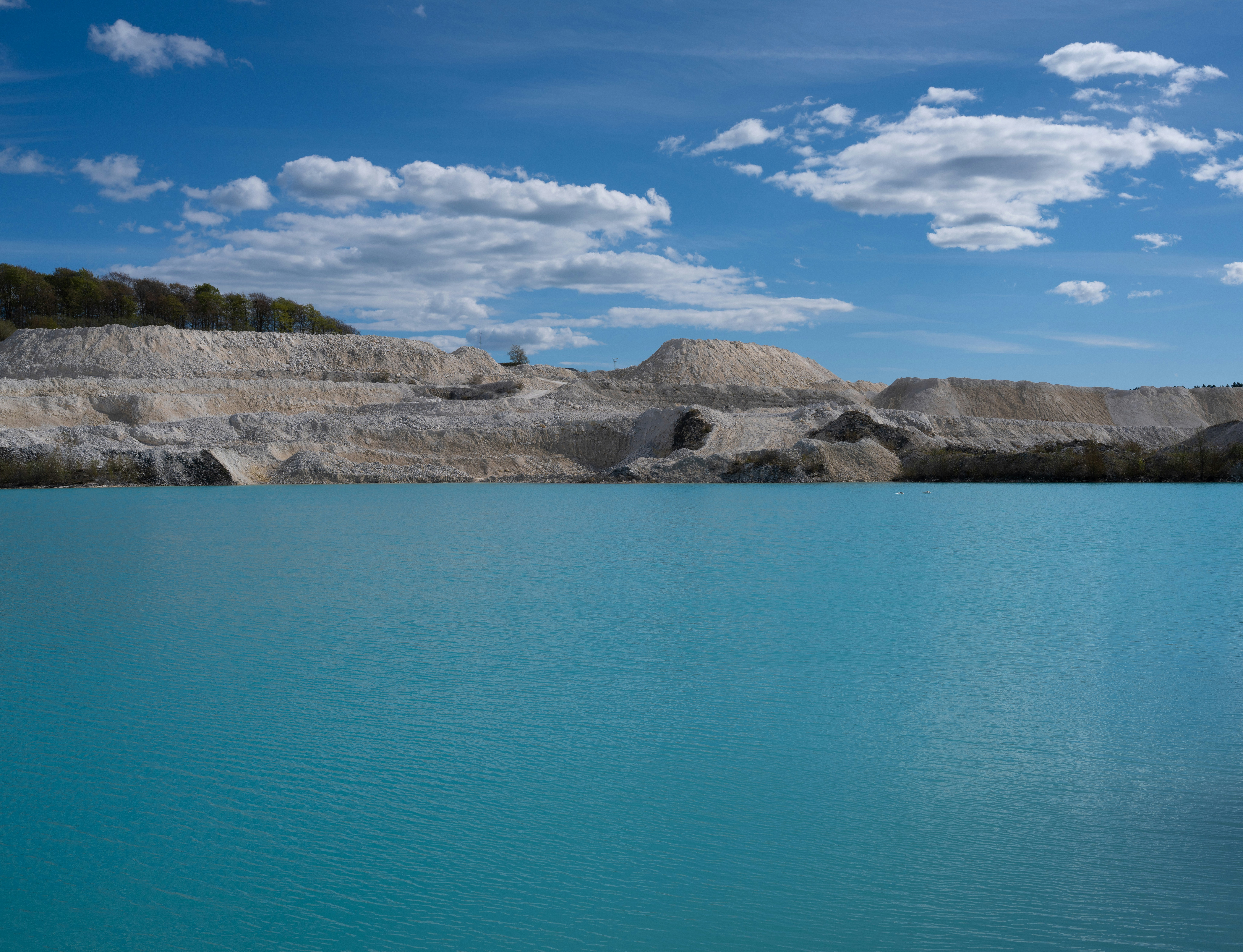 Turquoise Basin Under a Cloud-Cleared Sky