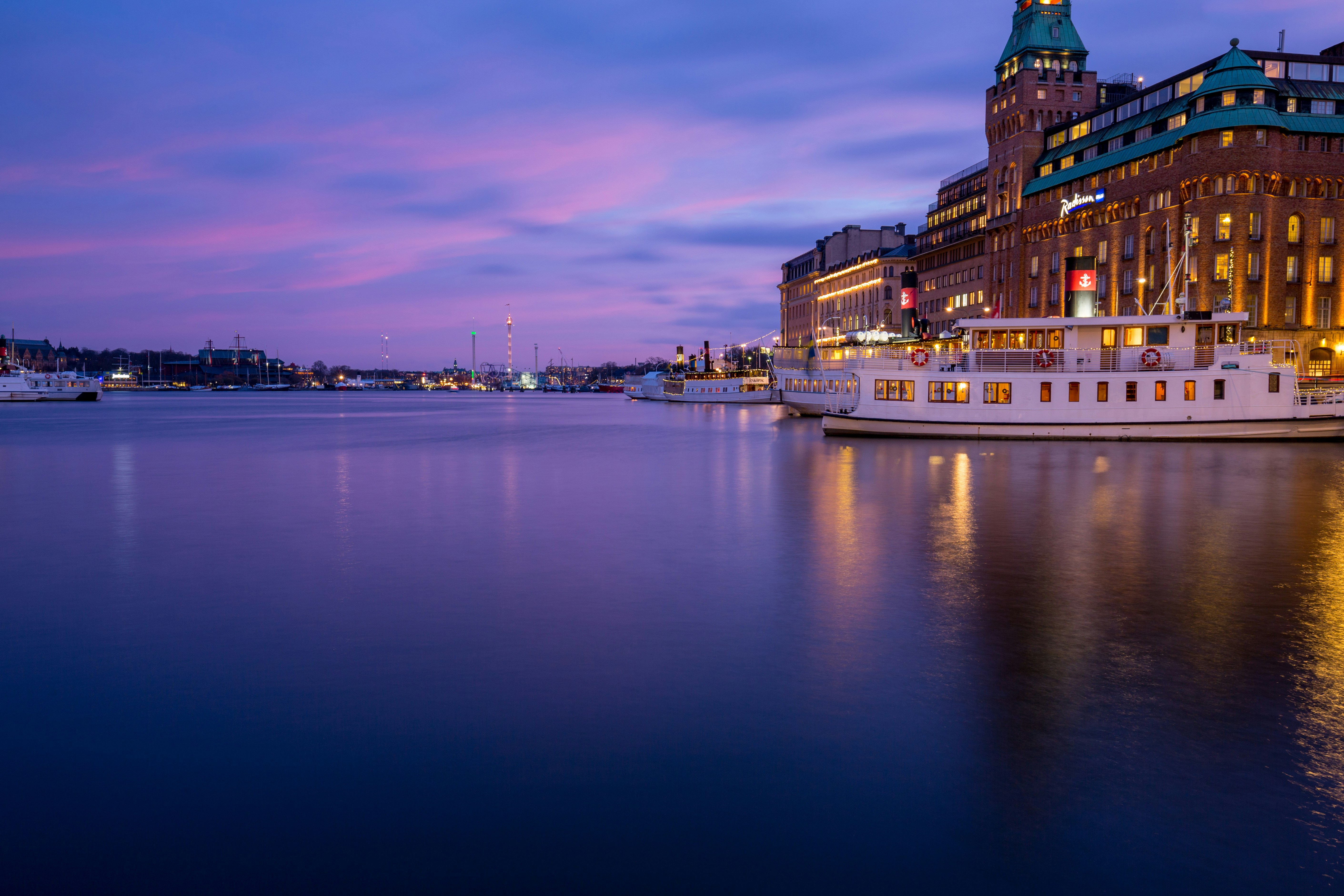 Harbor Lights: A Violet Dusk Over the City Cruise
