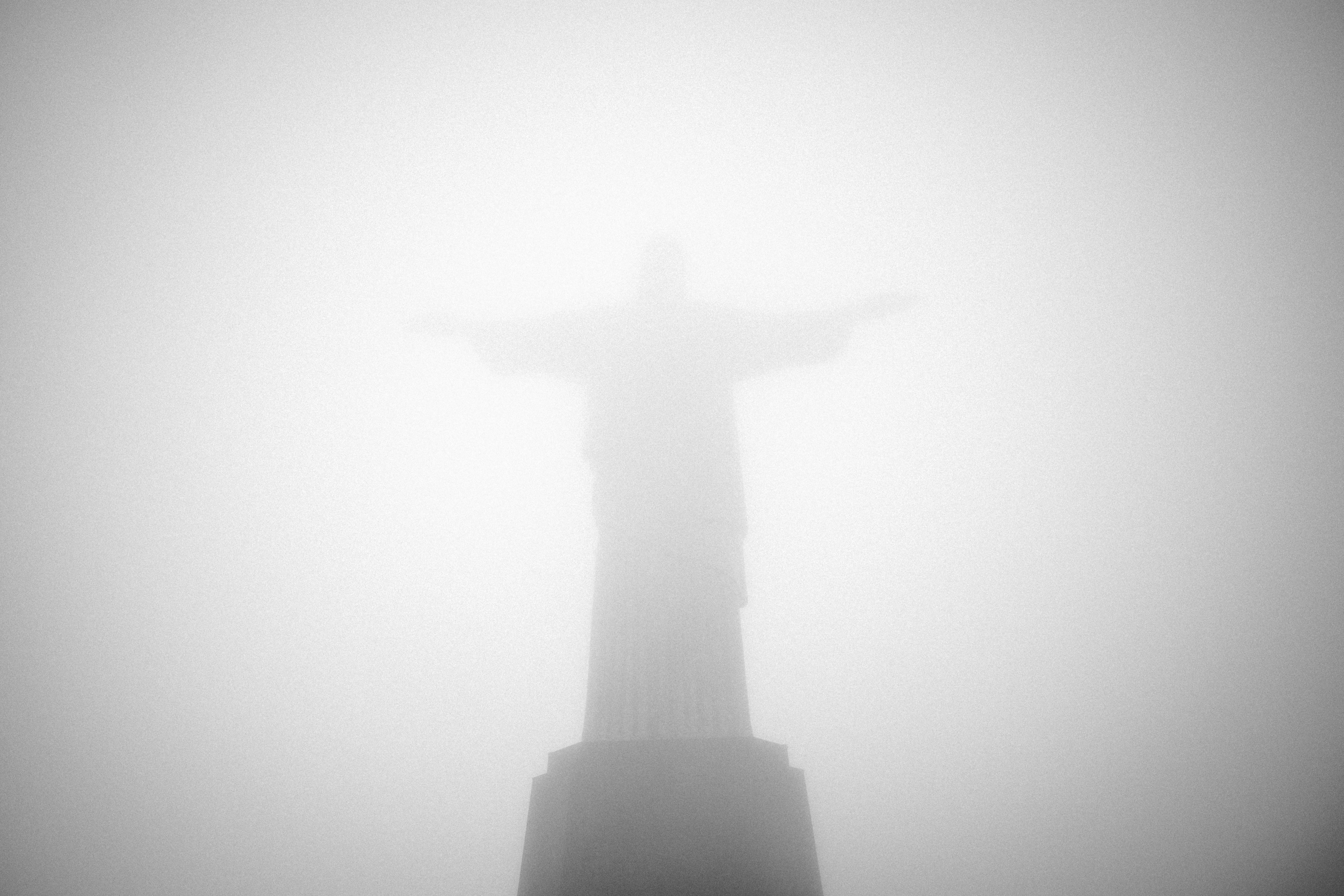 Ethereal Arc: The Striking Silhouette of a Monument in Veiled Light