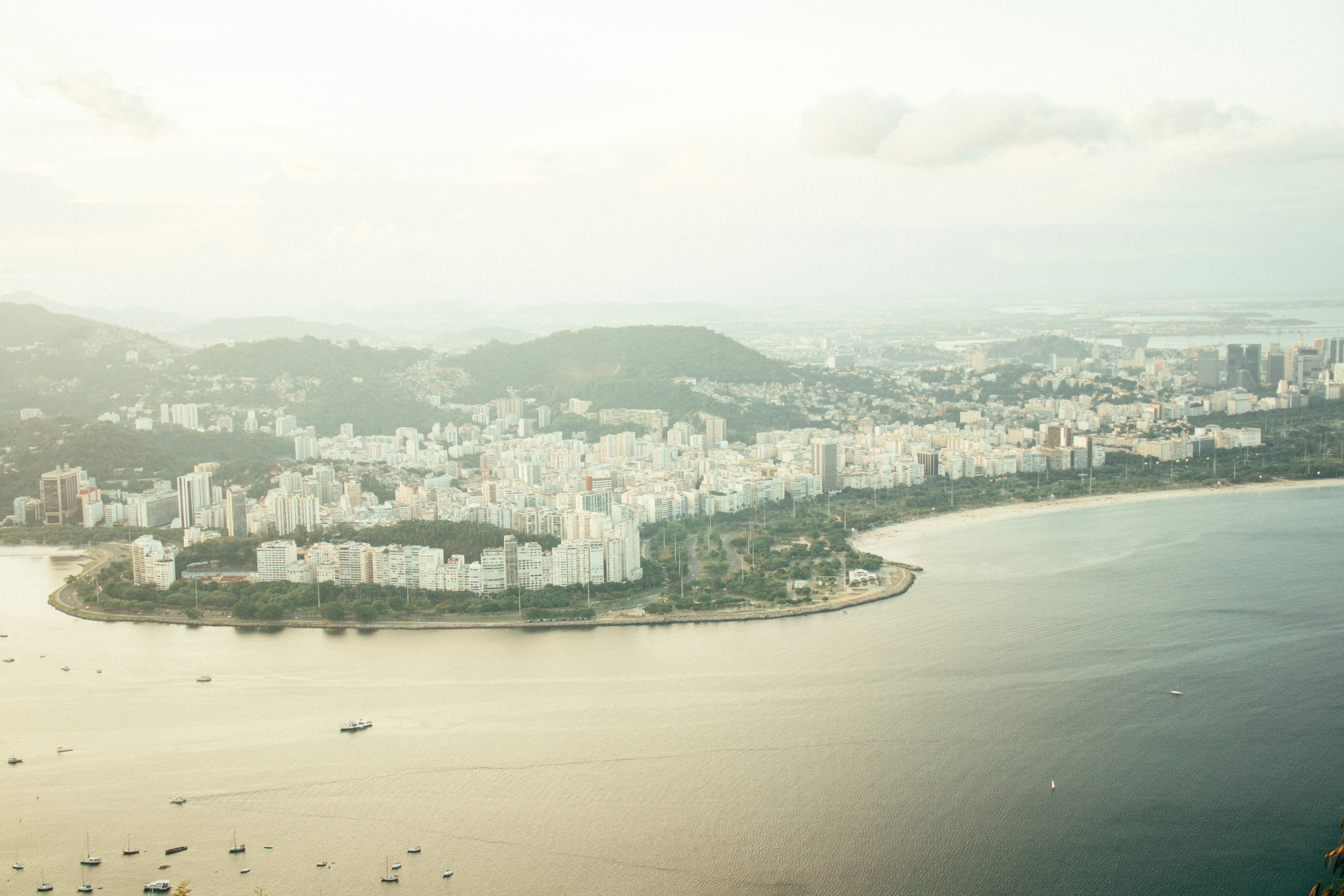Harbor Crest: A Coastal Cityscape Embraced by Gentle Hills