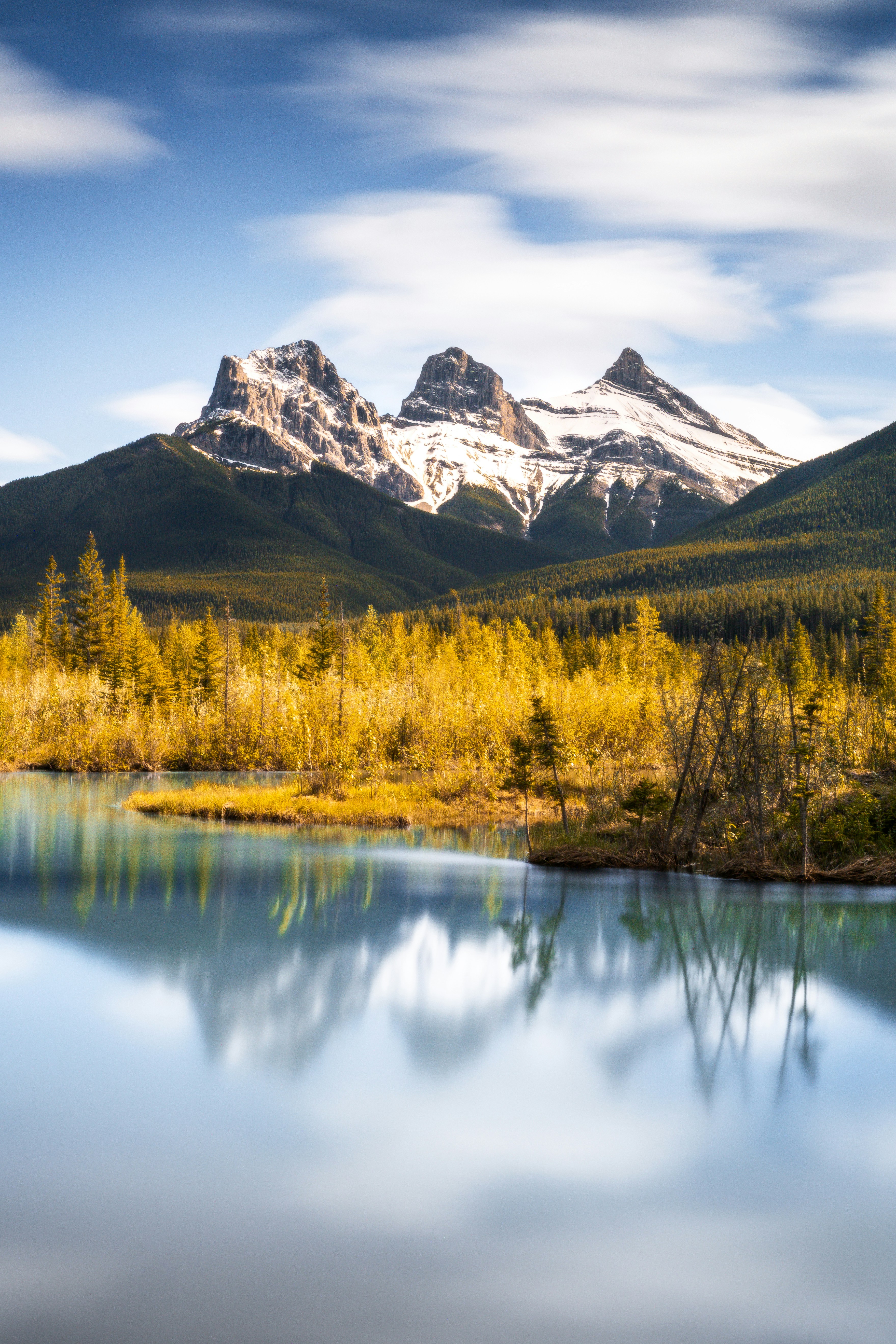 Snow-Capped Peaks Embraced by Autumn Waters