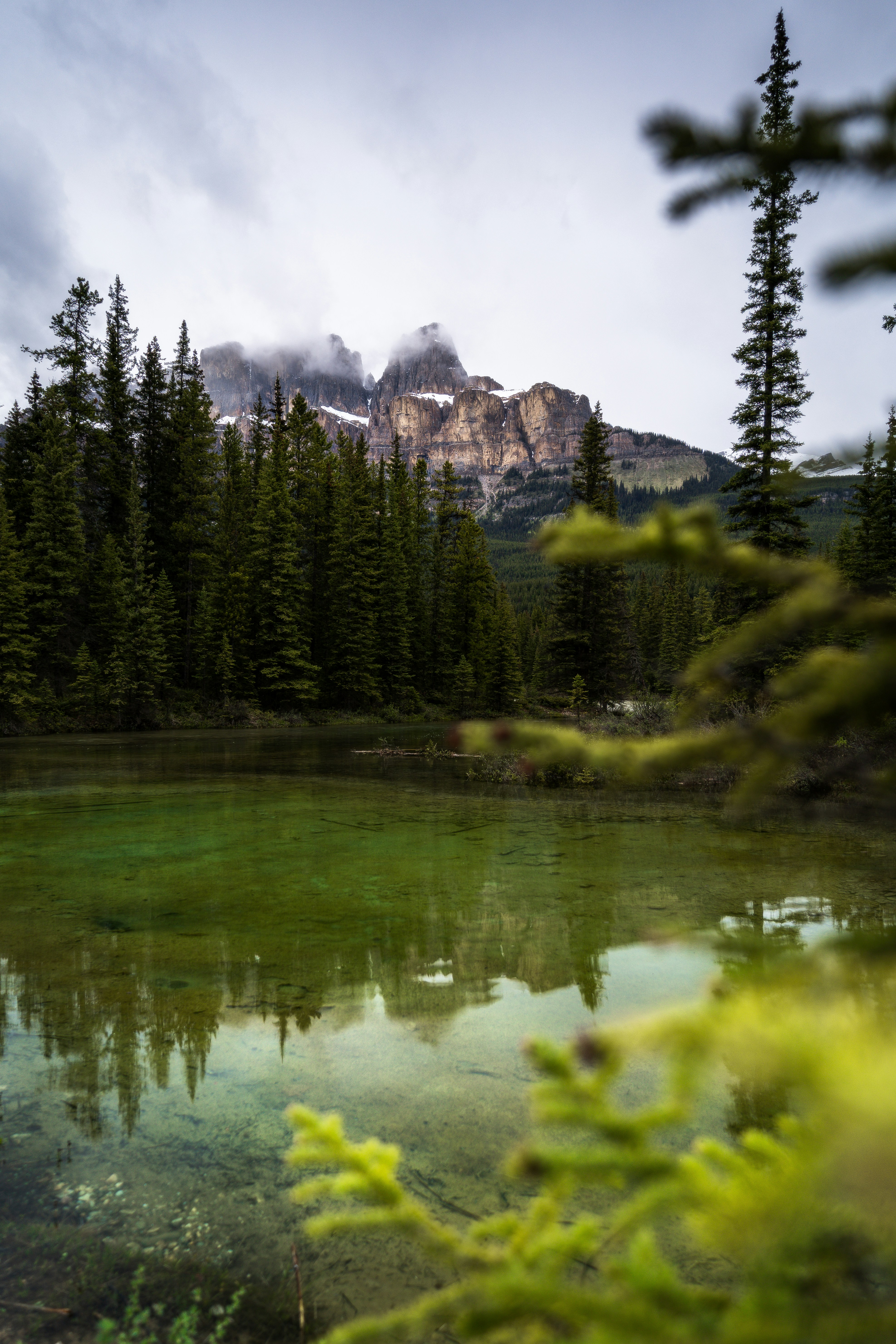 Emerald Lake Reflections beneath a Craggy Alpine Crest