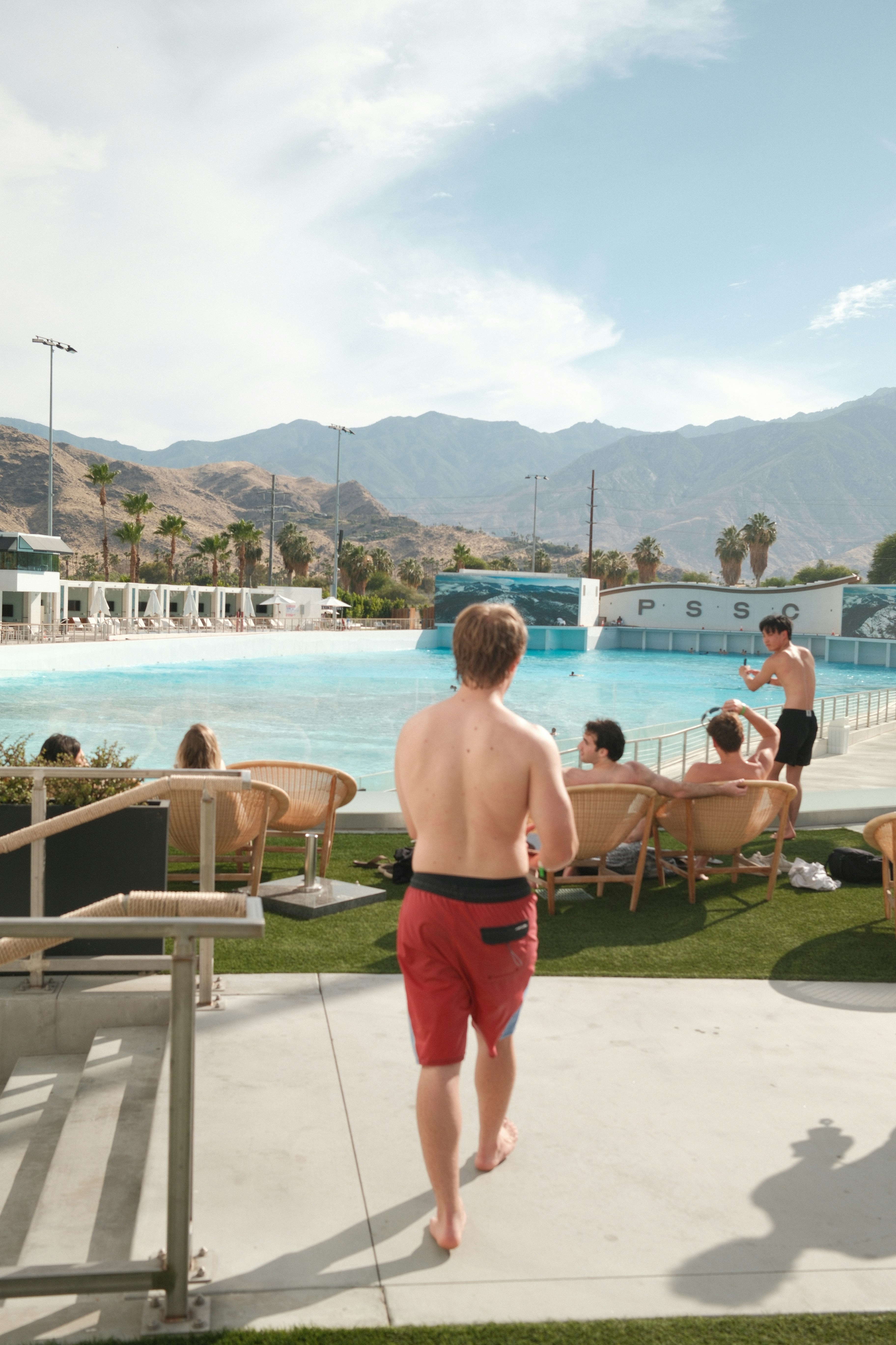 Sunlit Poolside Pause: A Family Day by the Desert Oasis