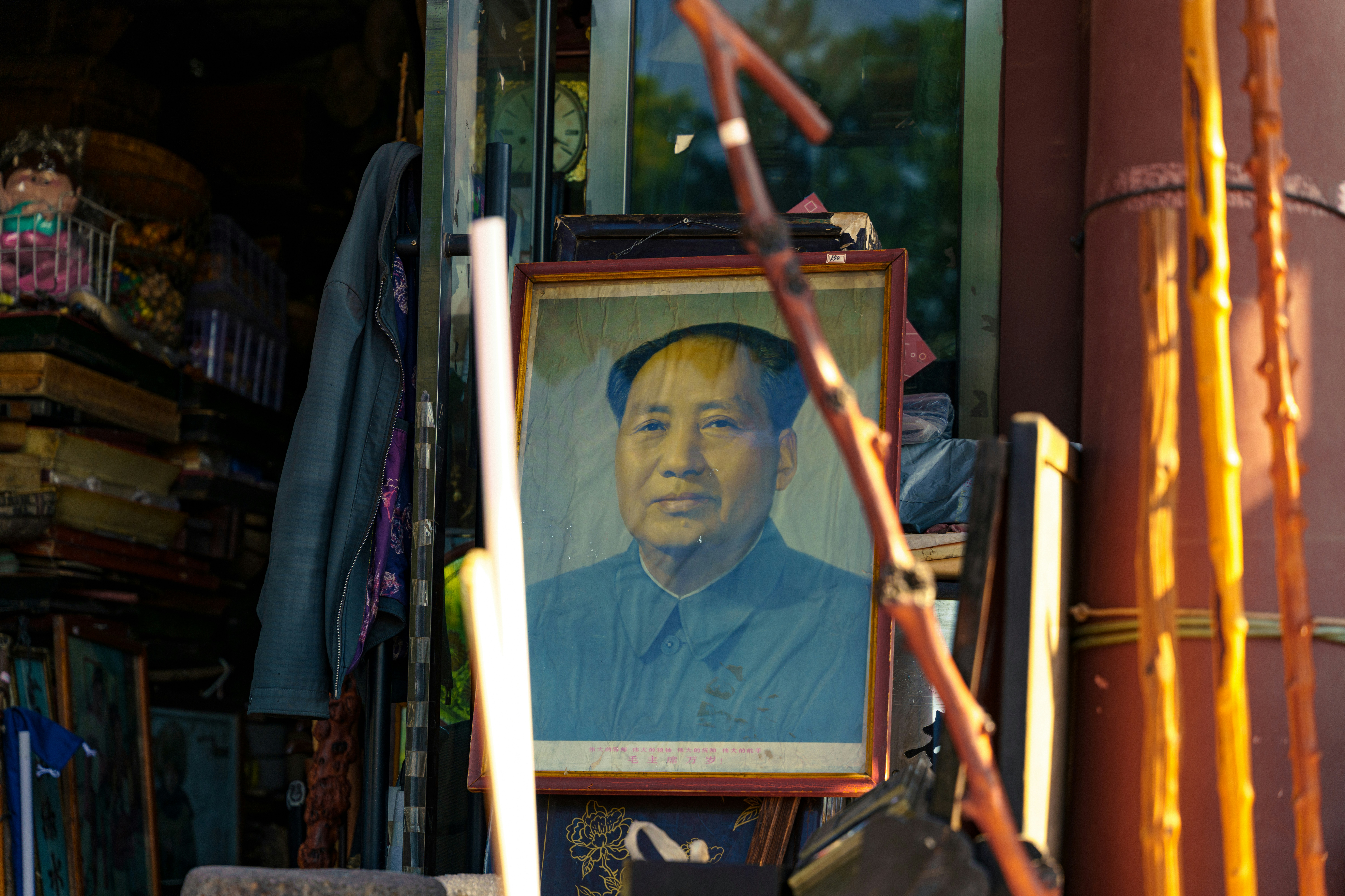 Portrait of mao zedong in a shop window.