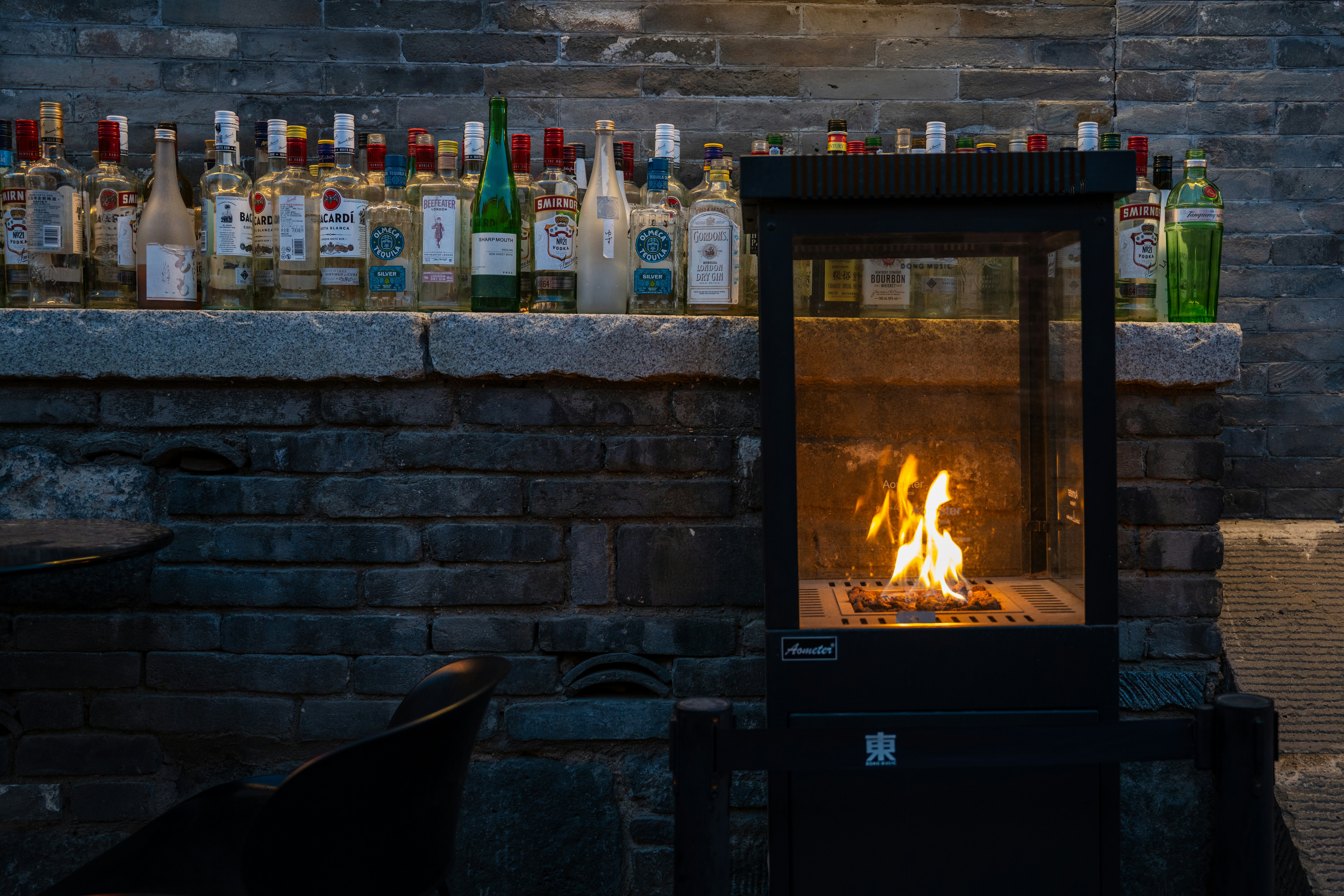 Warm Glow by the Bar: A Fireplace Corner