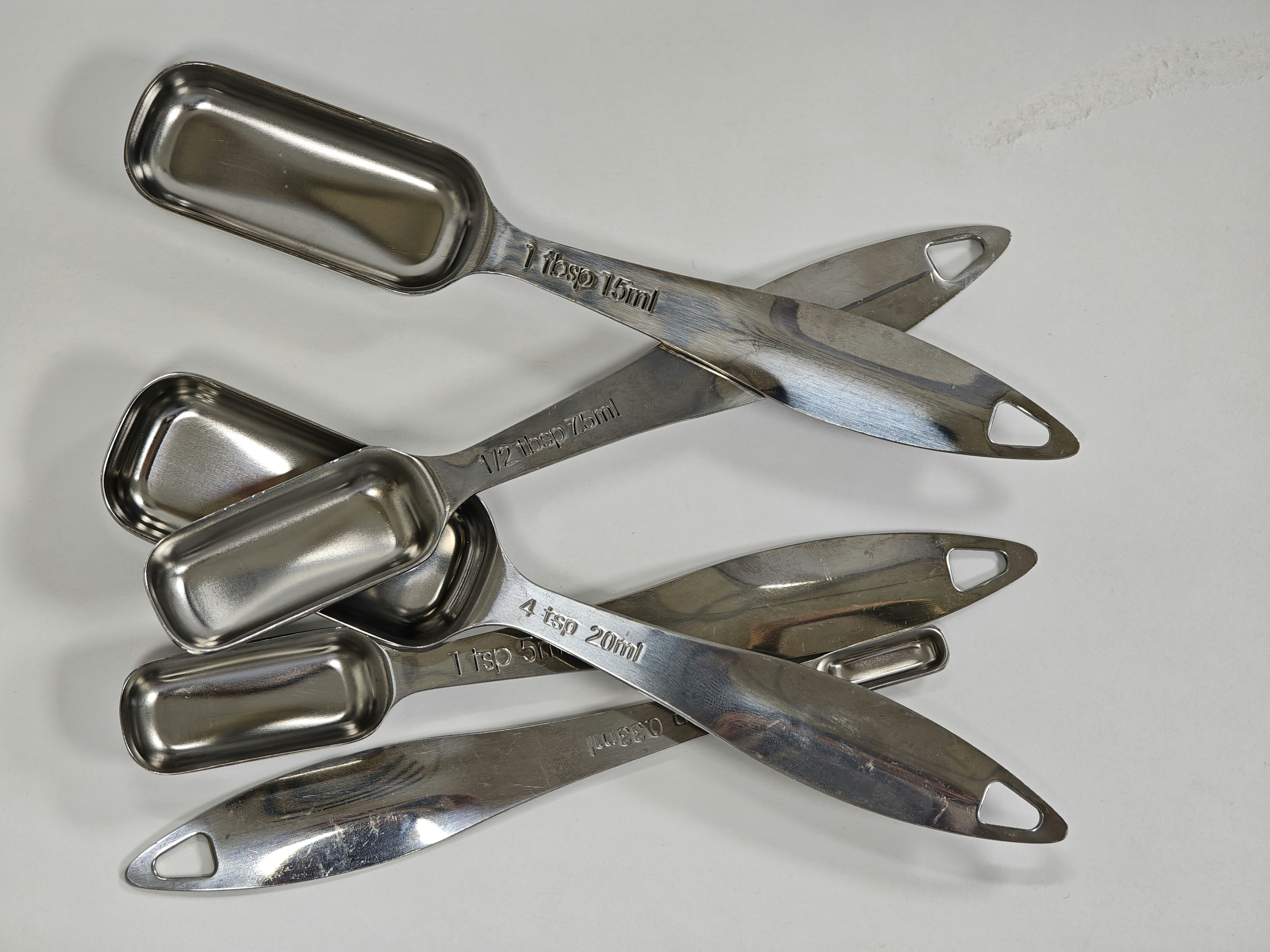 Shiny Steel Scissors Stack: A Compact Cutlery Constellation