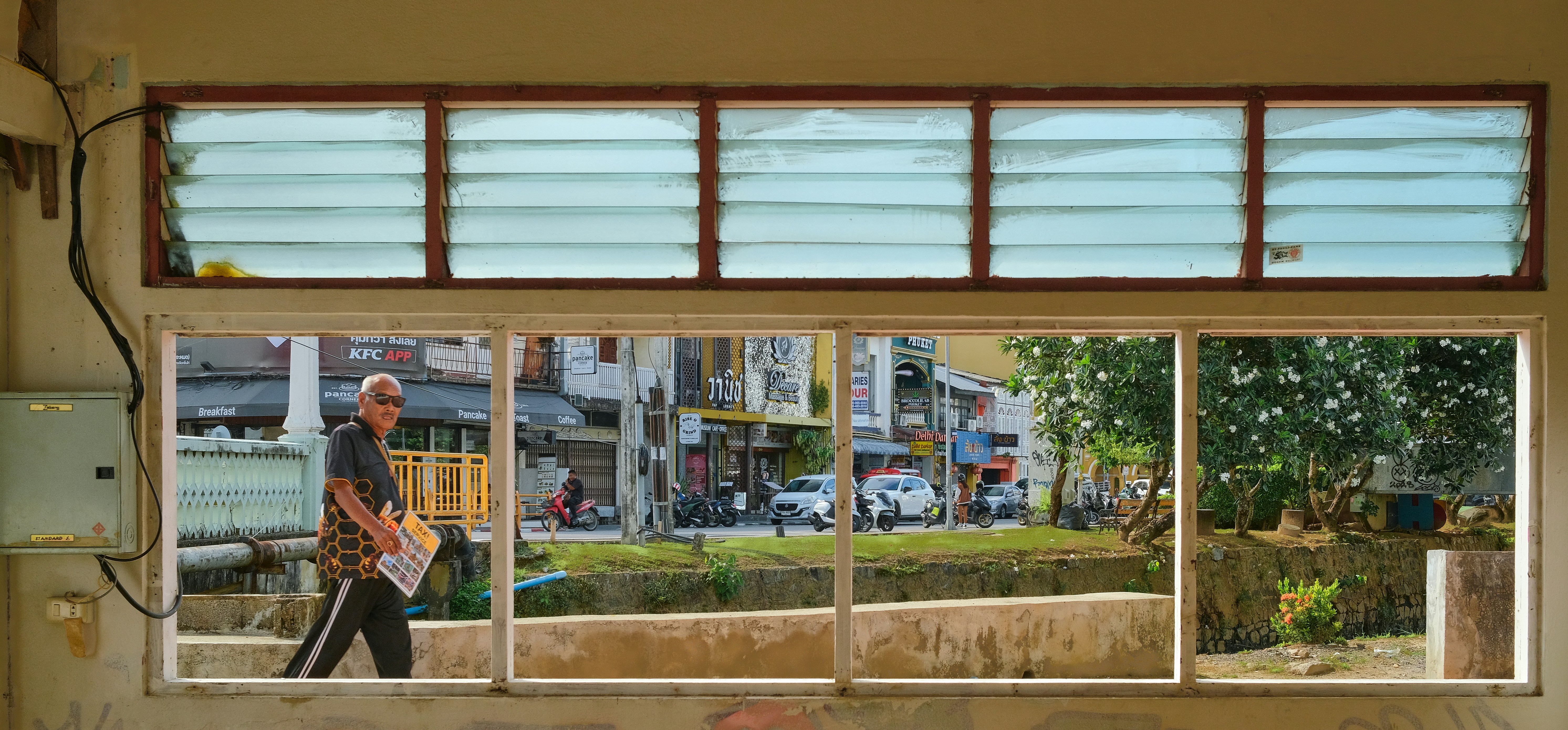 Frame Window: A Street View Framed by an Abandoned Room