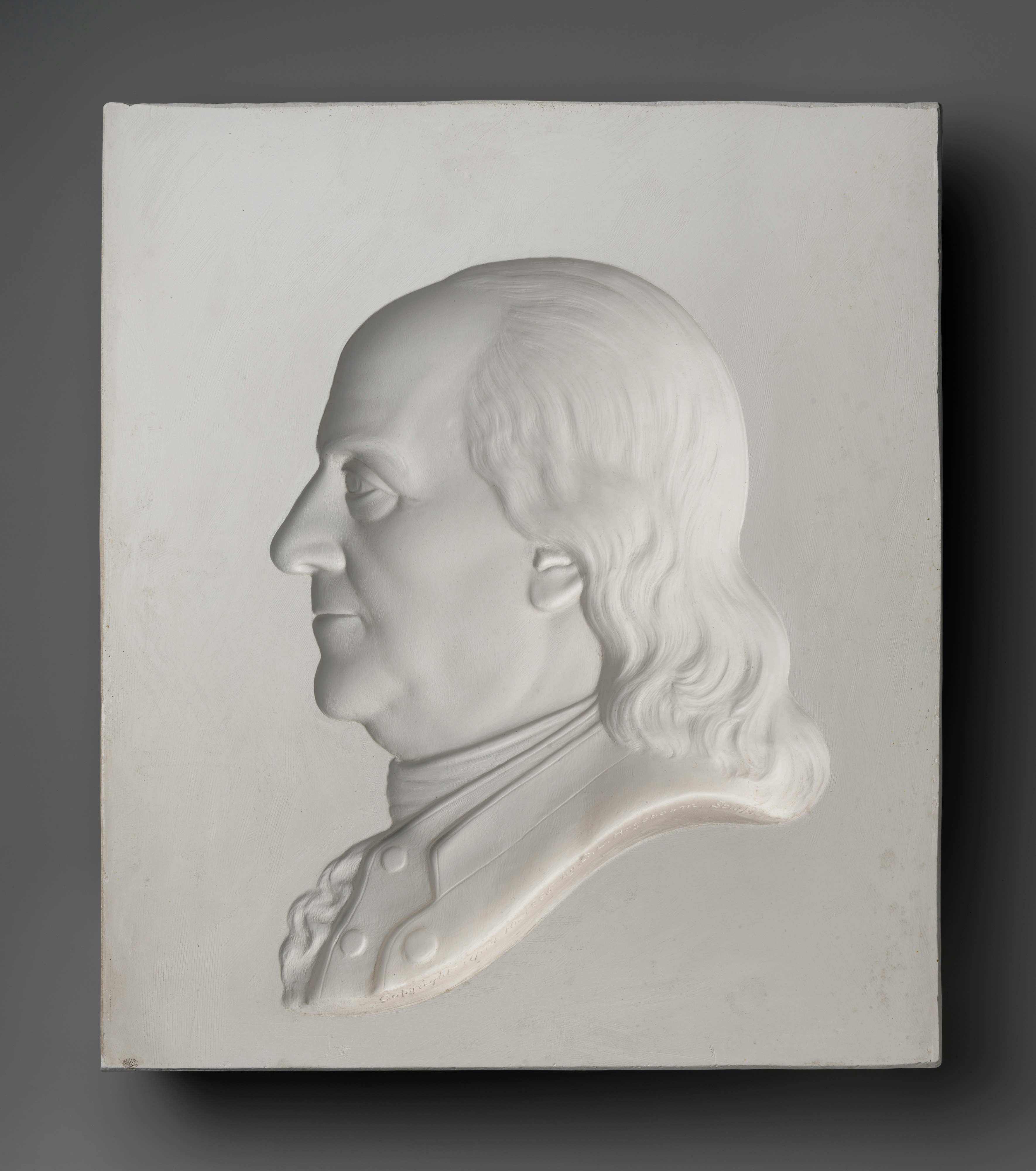 Title: Benjamin Franklin, Artist: Charles L. Hogeboom (American, ca. 1827–1895), Date: by 1885, Medium: Plaster, Dimensions: 18 11/16 × 16 1/4 × 2 3/16 in. (47.5 × 41.3 × 5.6 cm), Framed: 26 1/2 in. × 24 in. × 3 in. (67.3 × 61 × 7.6 cm), Credit Line: Gift of the sculptor, 1885, Object Number: 85.16.1, Curatorial Department: The American Wing