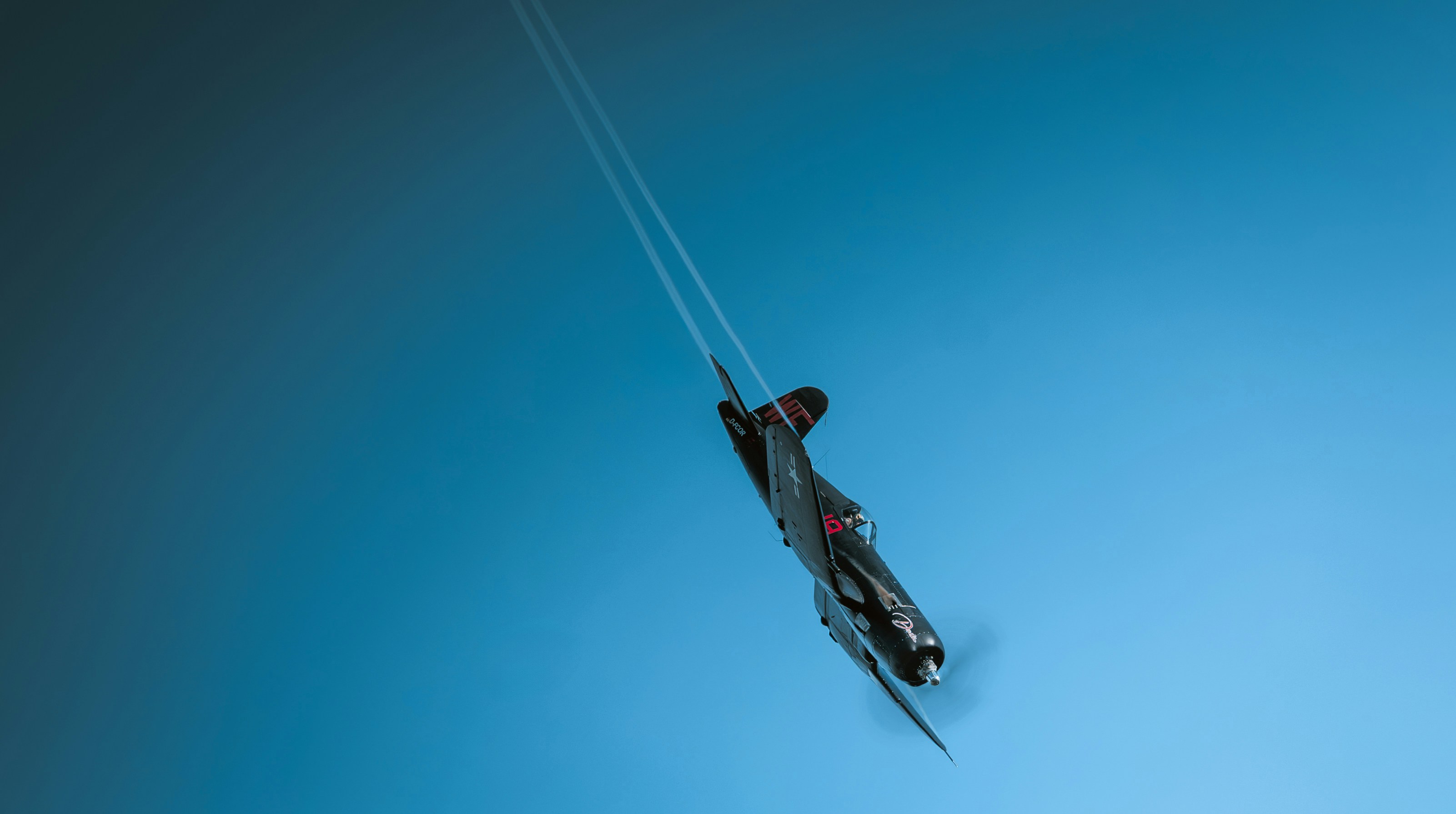 Soaring Arc: A Ski Jump Against a Narrow-Blue Sky