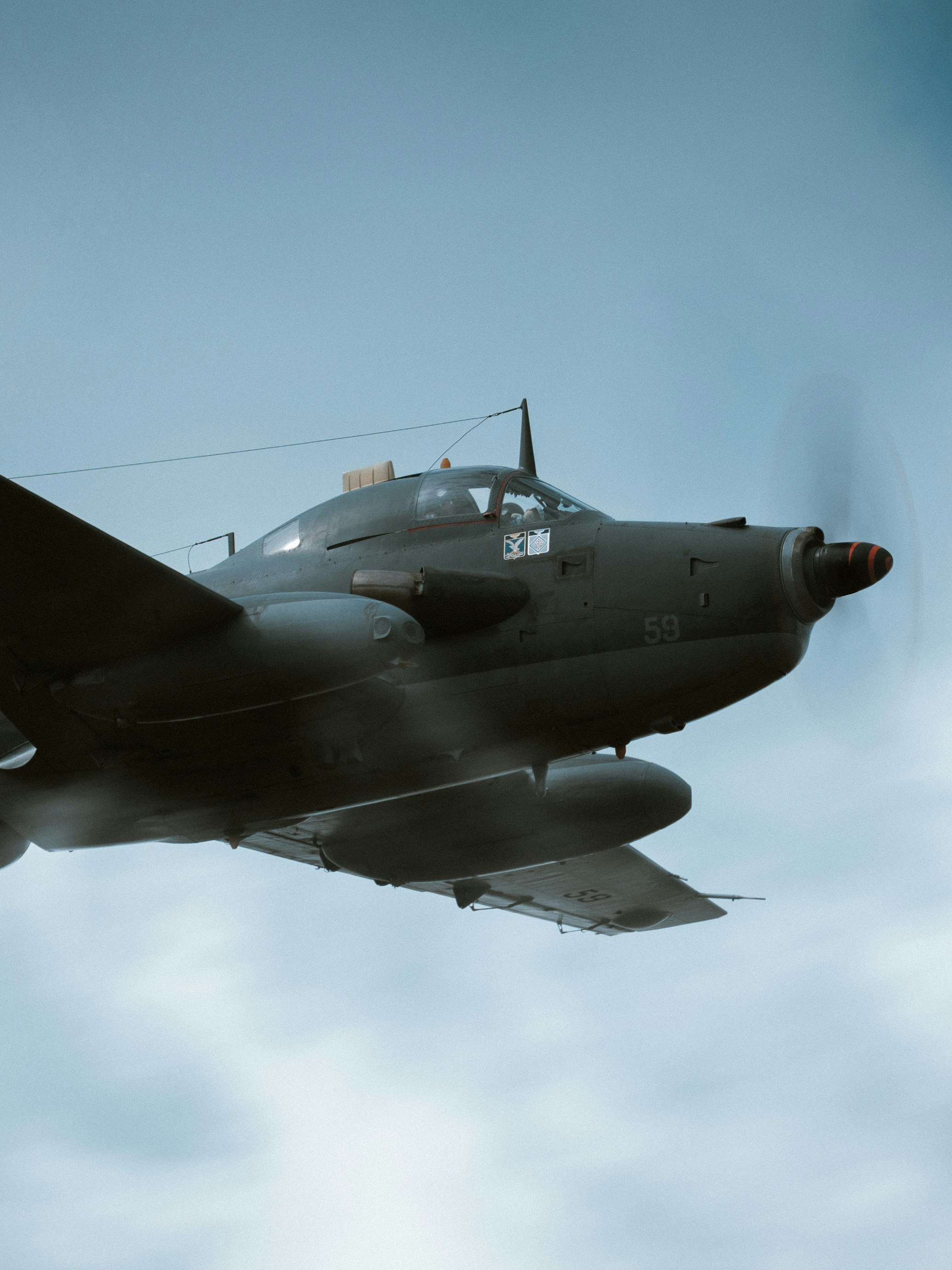 Turbulent Skies: A Vintage Warbird in Flight