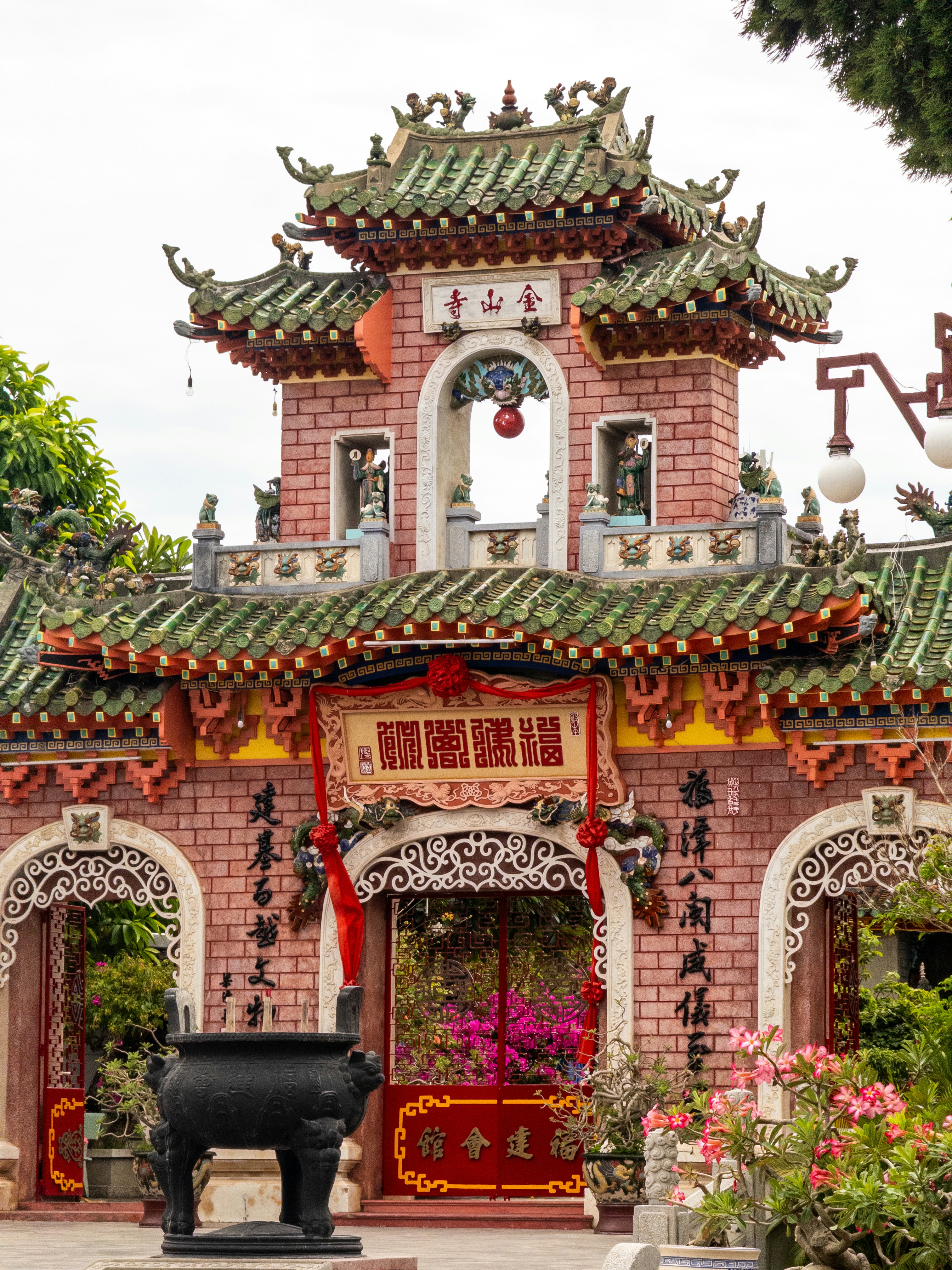Temple Gate with Lantern Archway and Stone Vessel