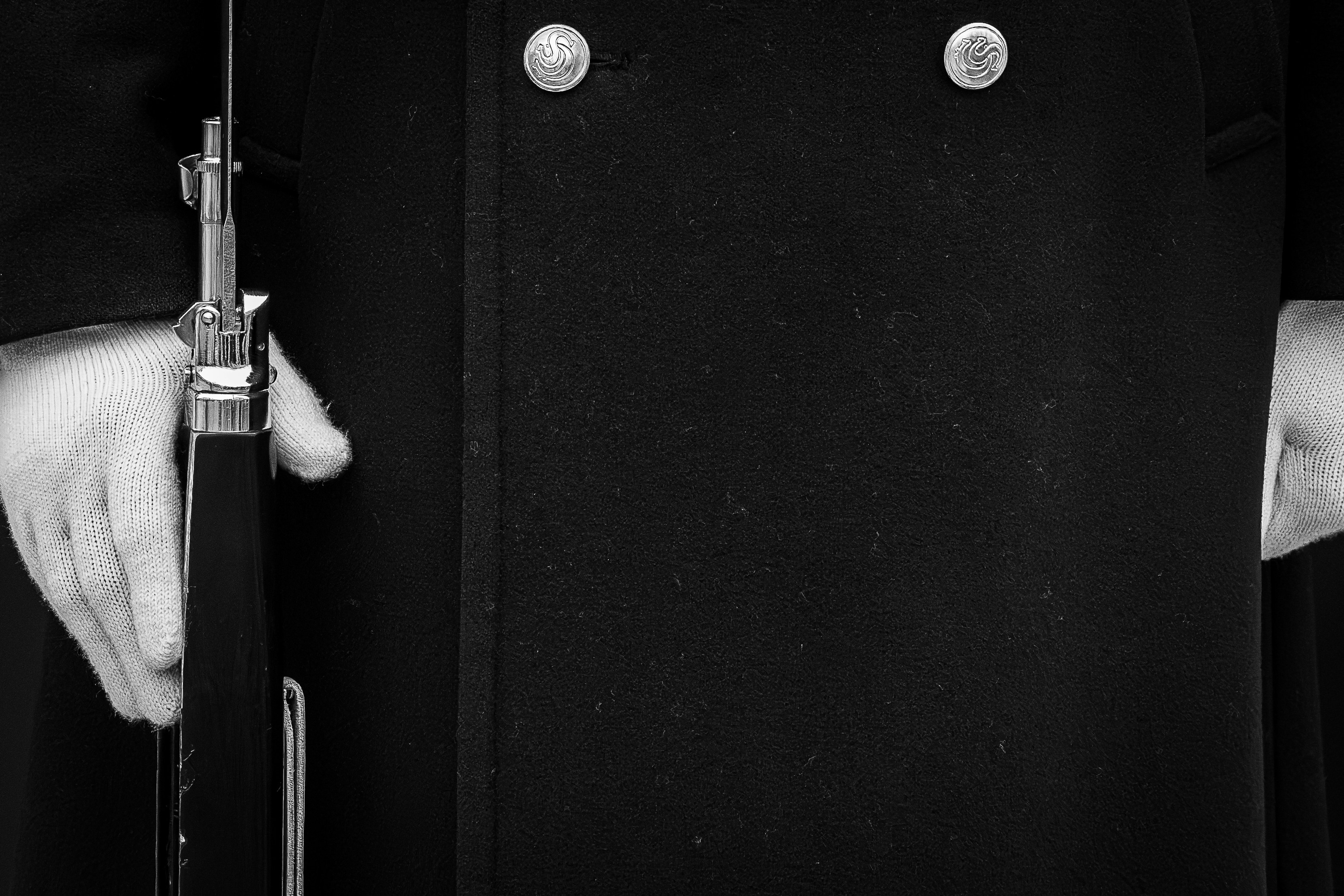 Silhouette of a Uniformed Figure: A Close-Clipped Portrait of Authority