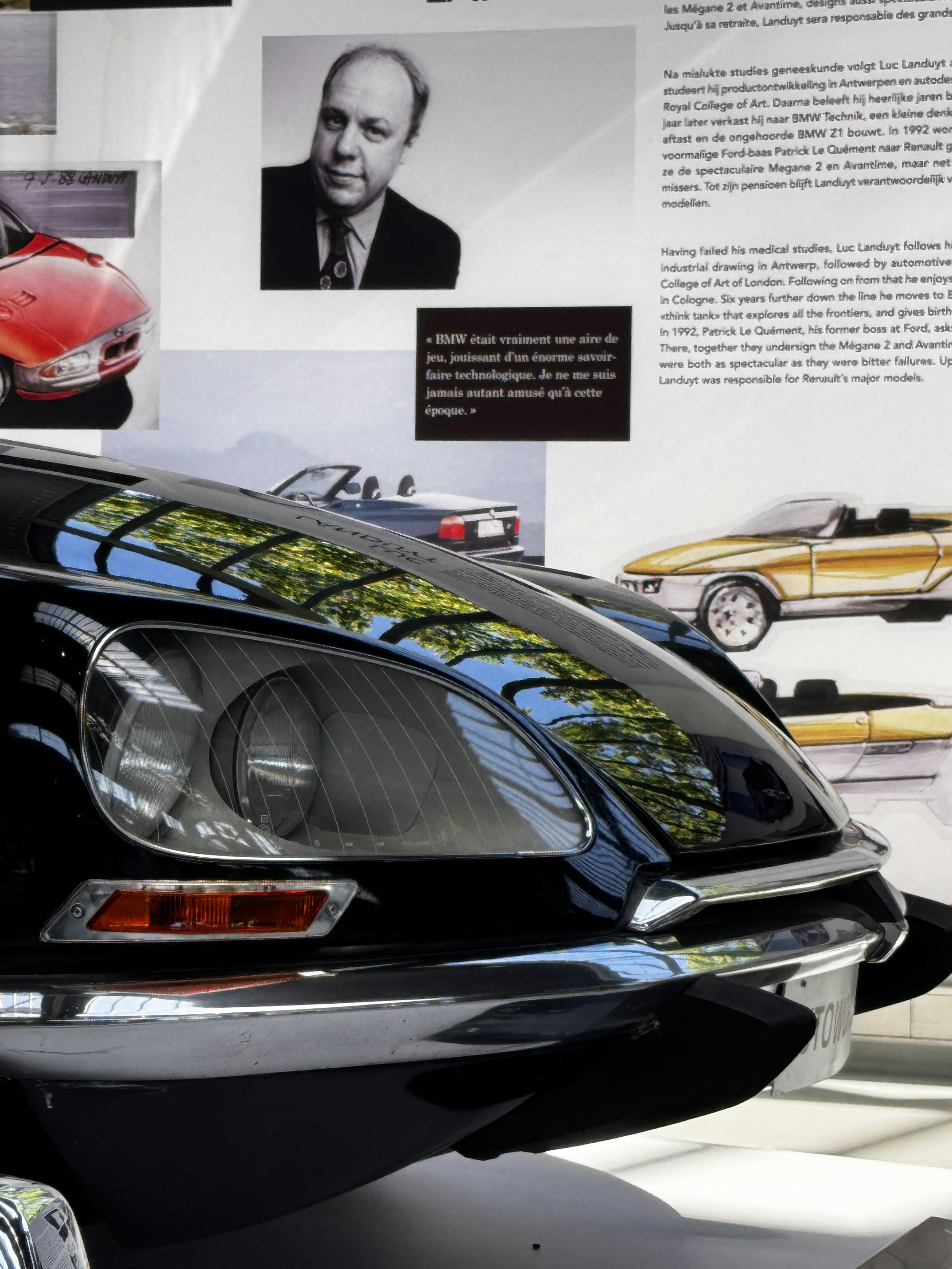 Shiny Porsche in a Classic Car Exhibition – Reflections on a Black Hood