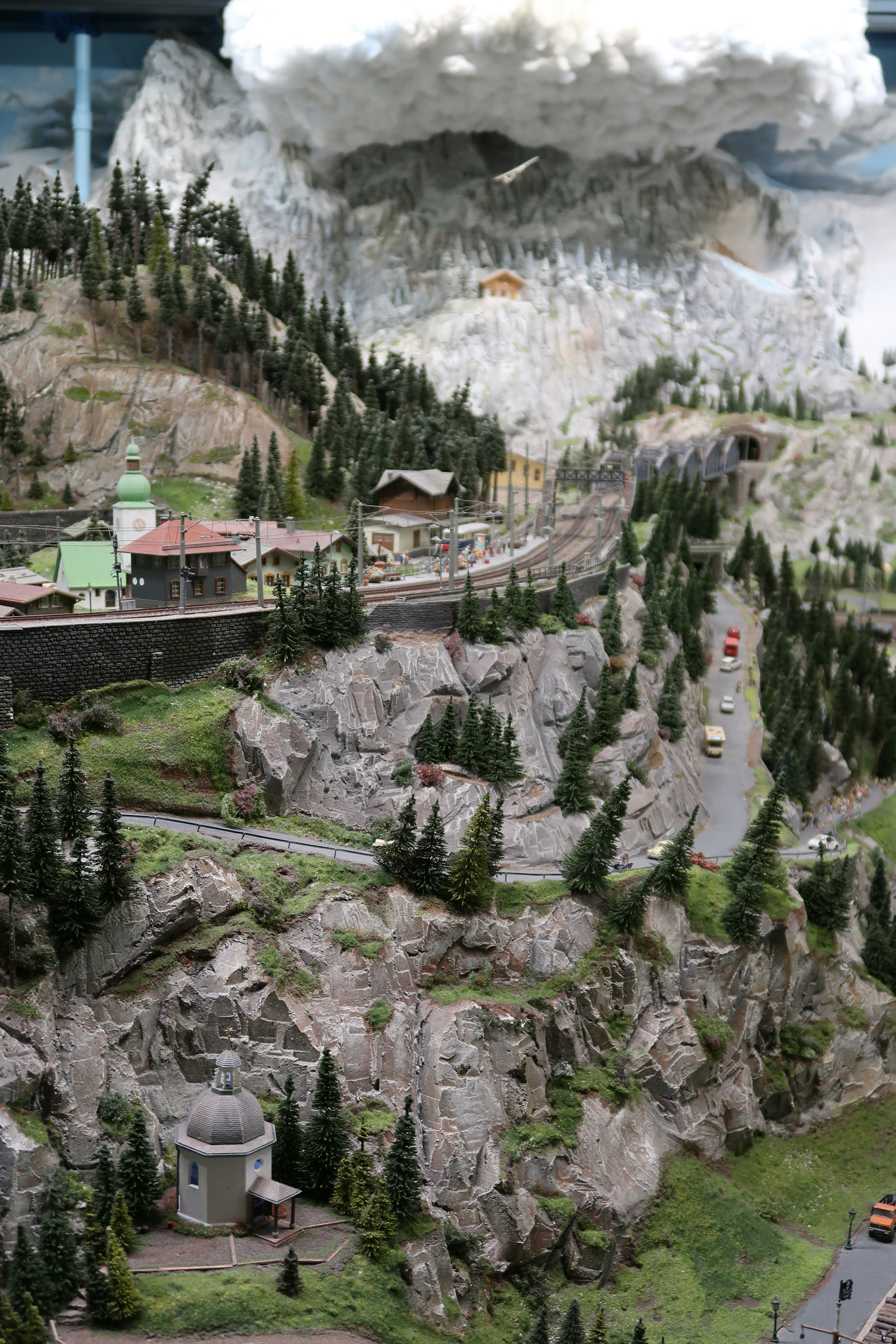 Miniature Alpine Crossing: A Scenic Model Village Clings to Jagged Cliffs