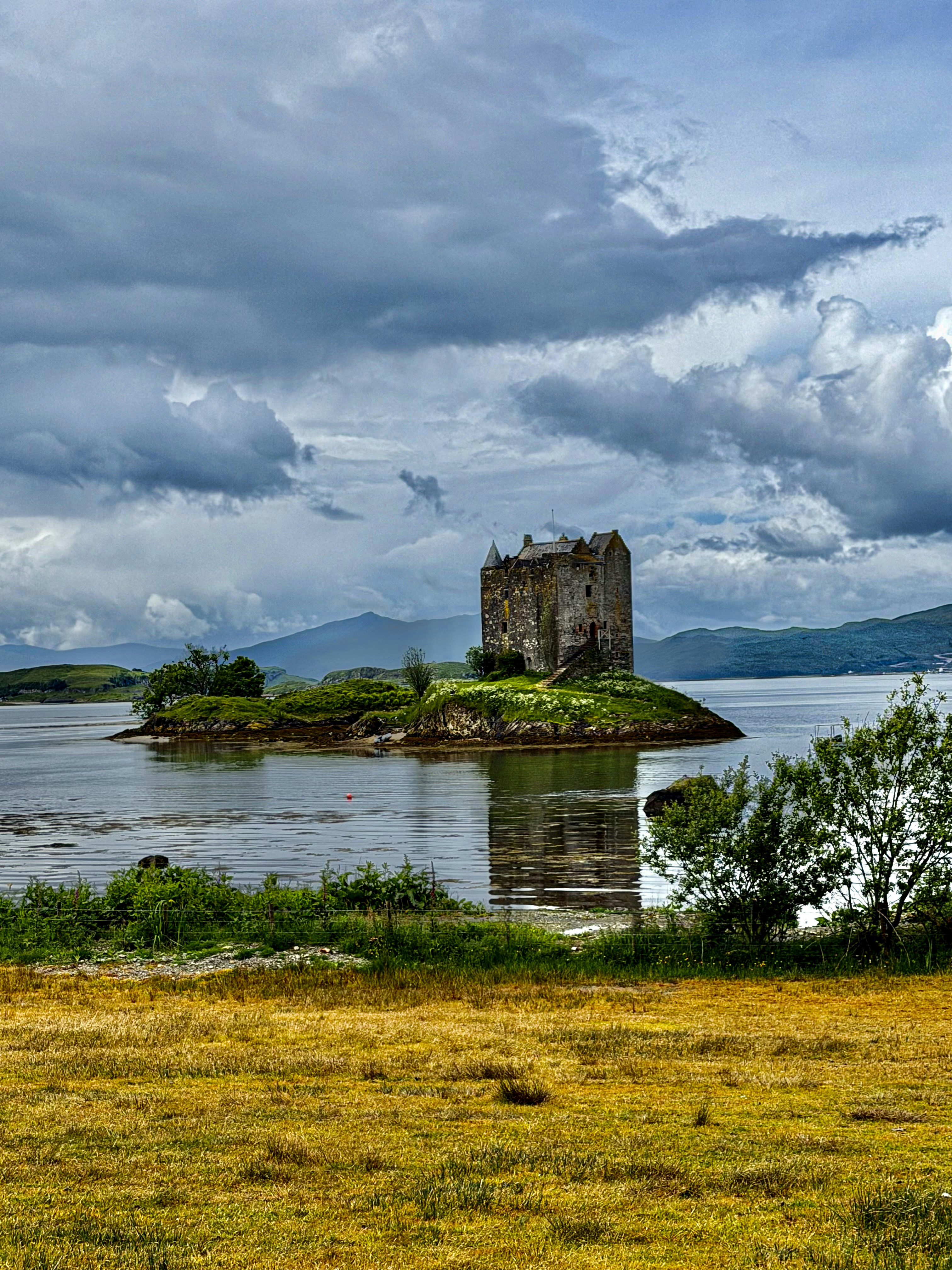 Castle on the Lake: An Isolated Stronghold Amid Calm Waters