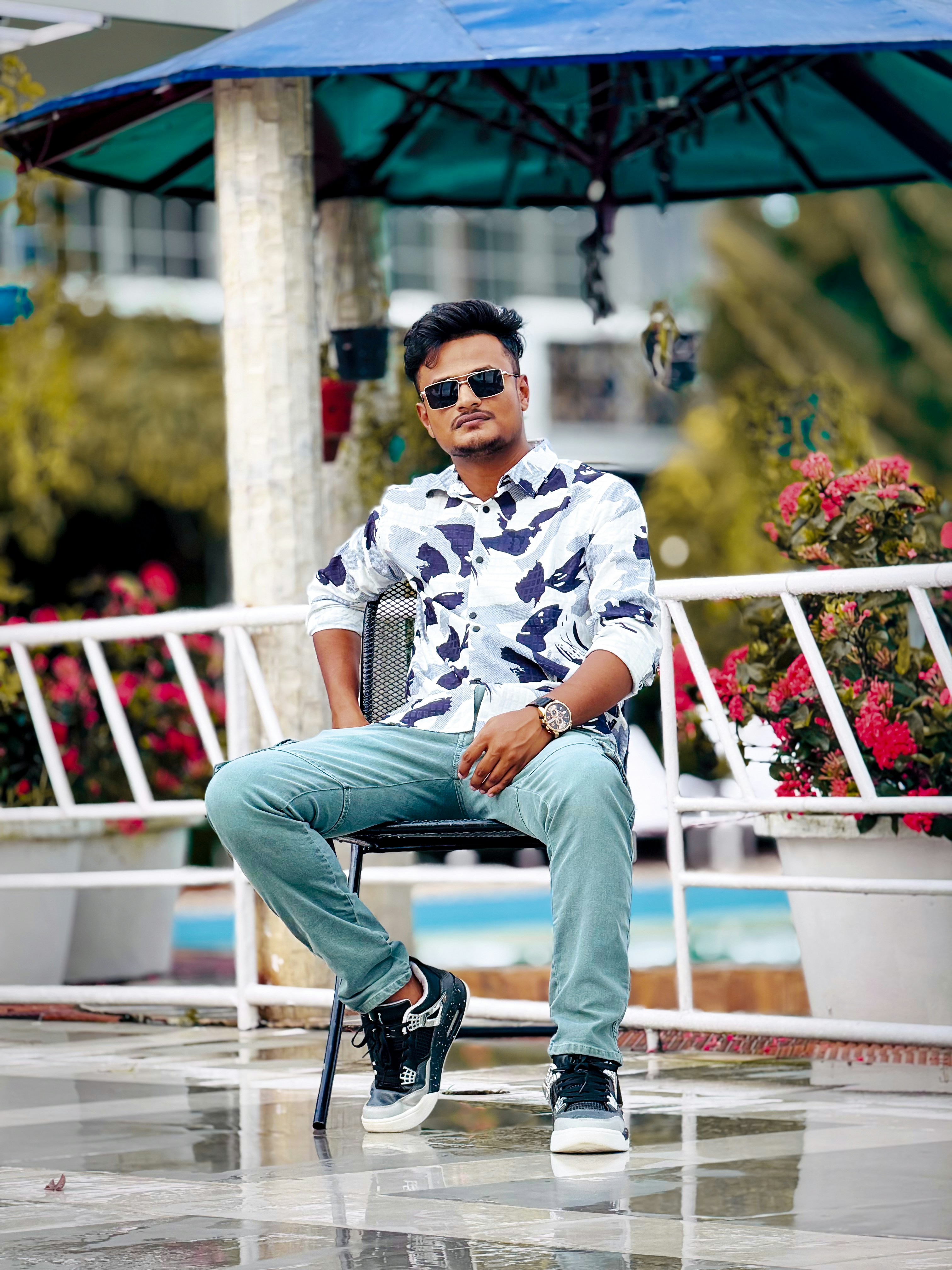 Chill Under the Turquoise Canopy: A Portrait at the Pool Deck