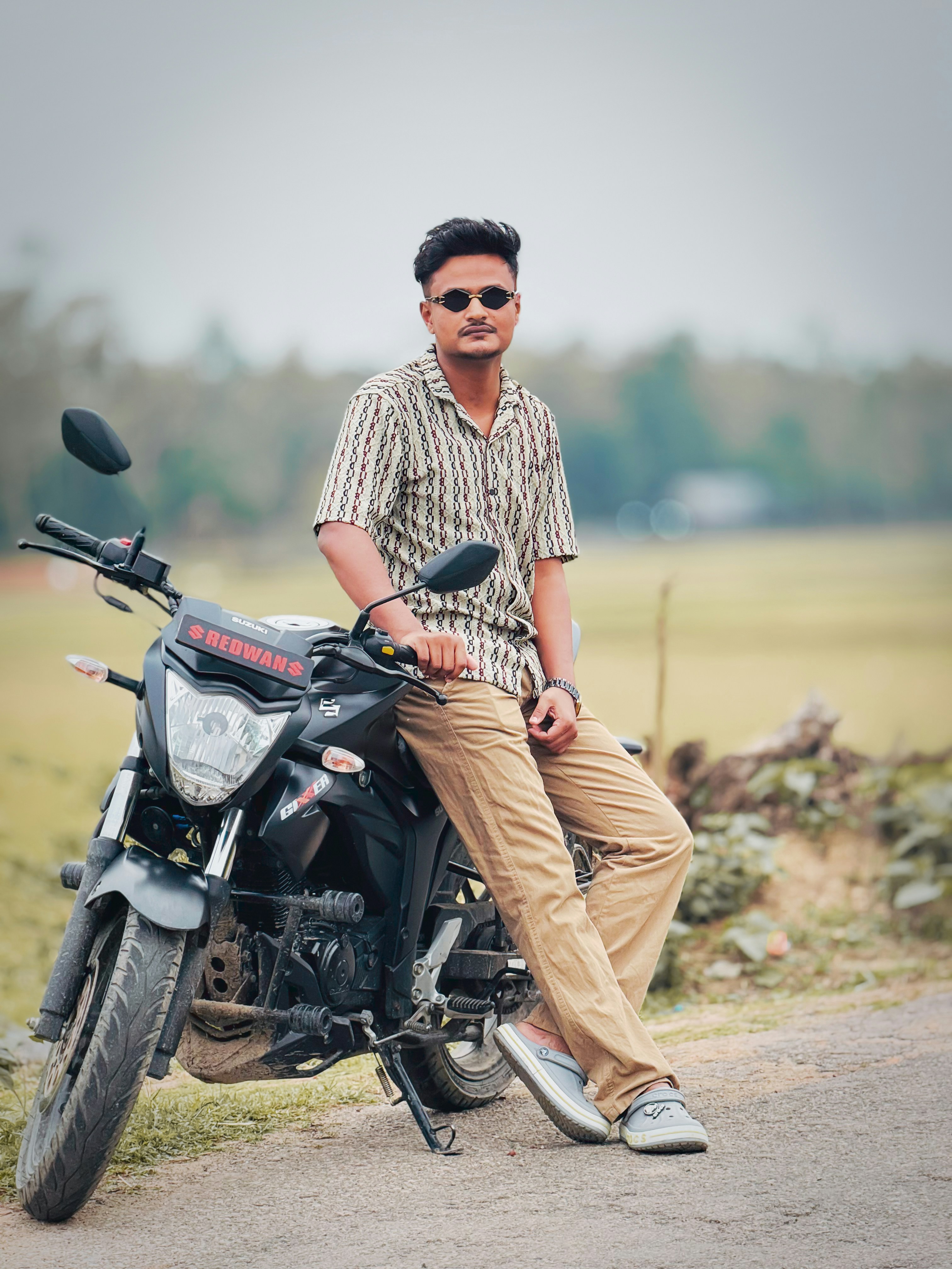 Portrait on the Ride: A Quiet Moment by the Bike