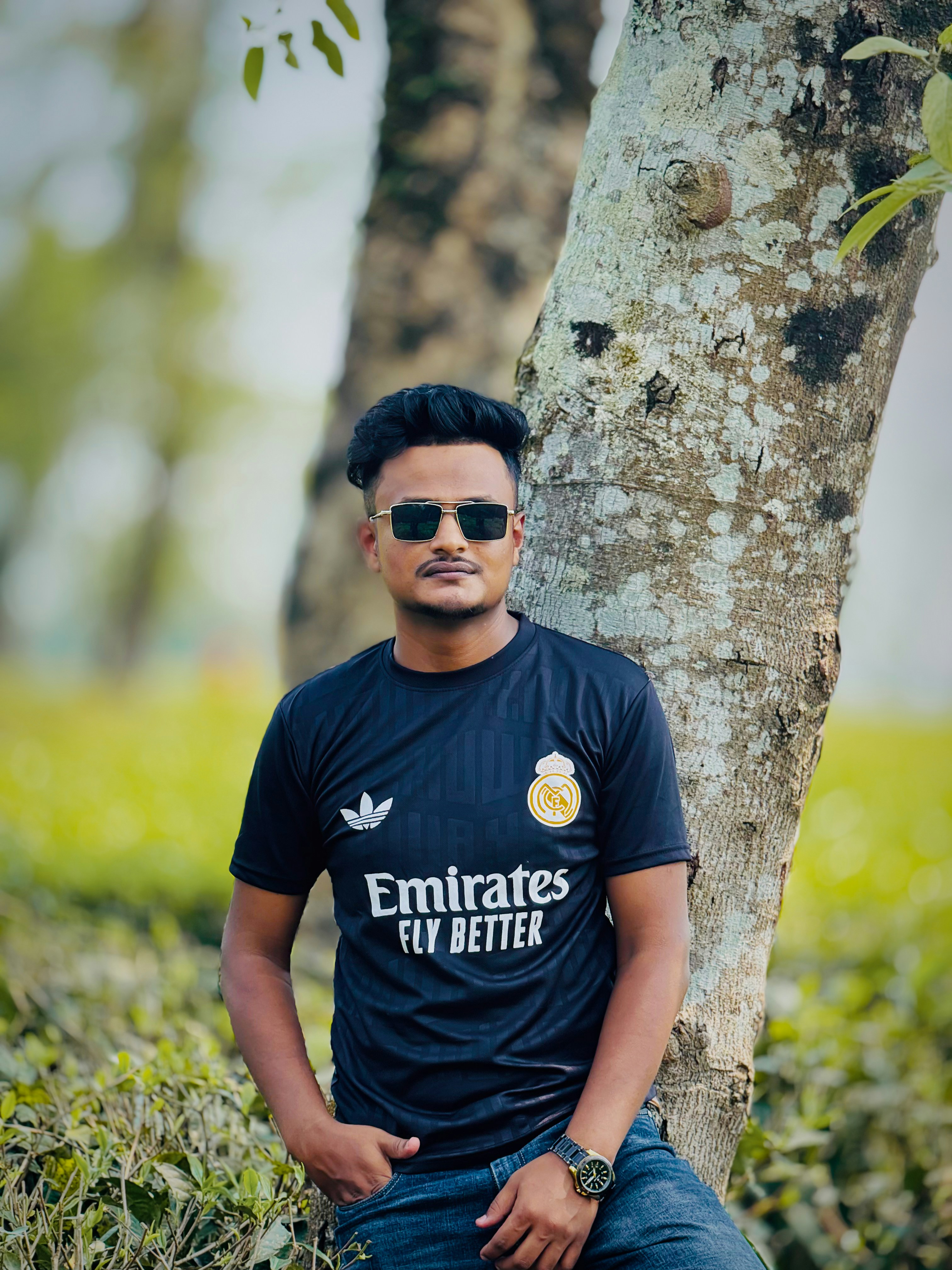 Portrait Under a Tree: Confidence in a Dark Tee