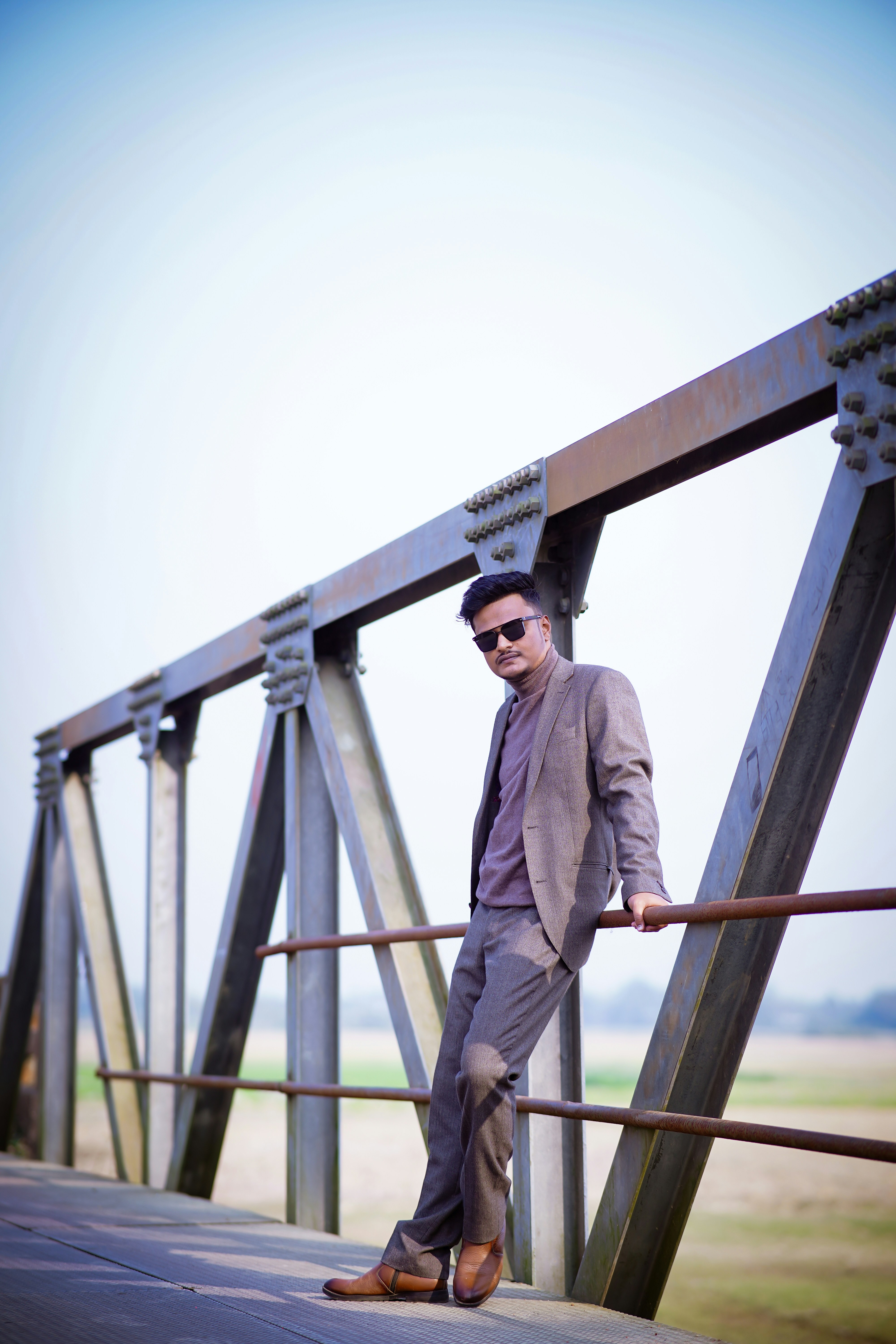 Steady Confidence on a Rusted Steel Bridge