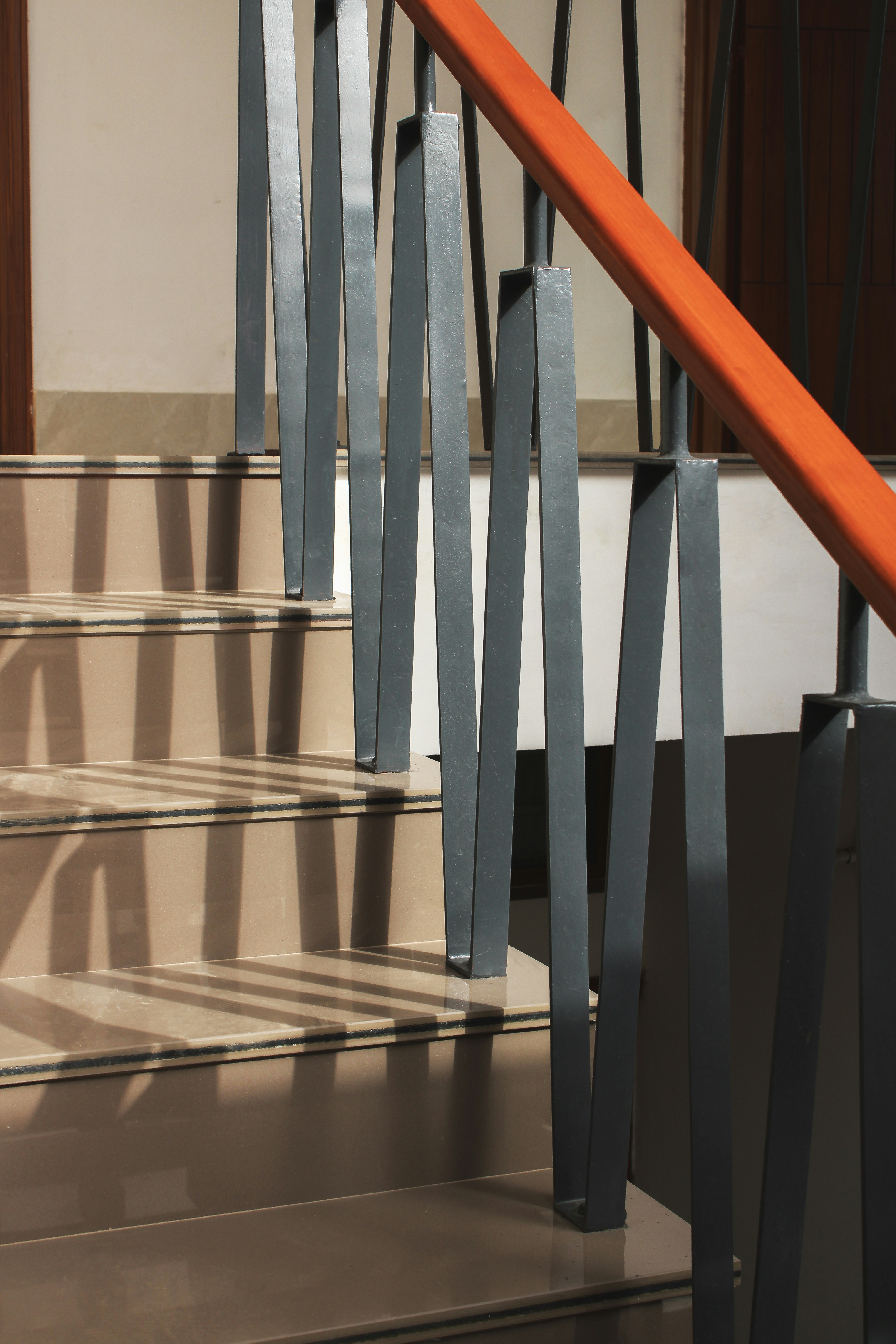 Industrial Staircase Shadows and Angled Railing