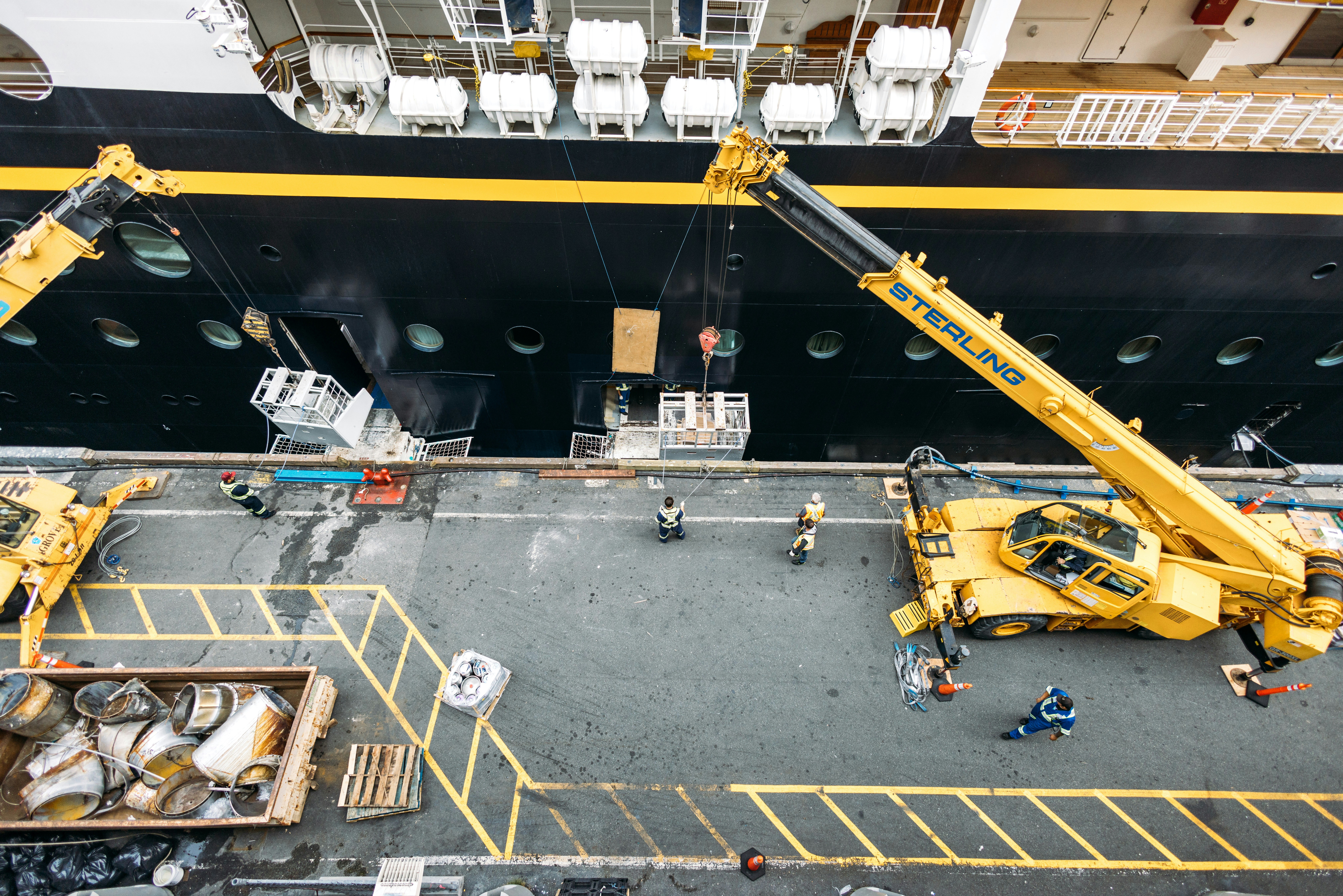 Industrial Ballet Above the Deck: Cranes, Crew, and Cargo