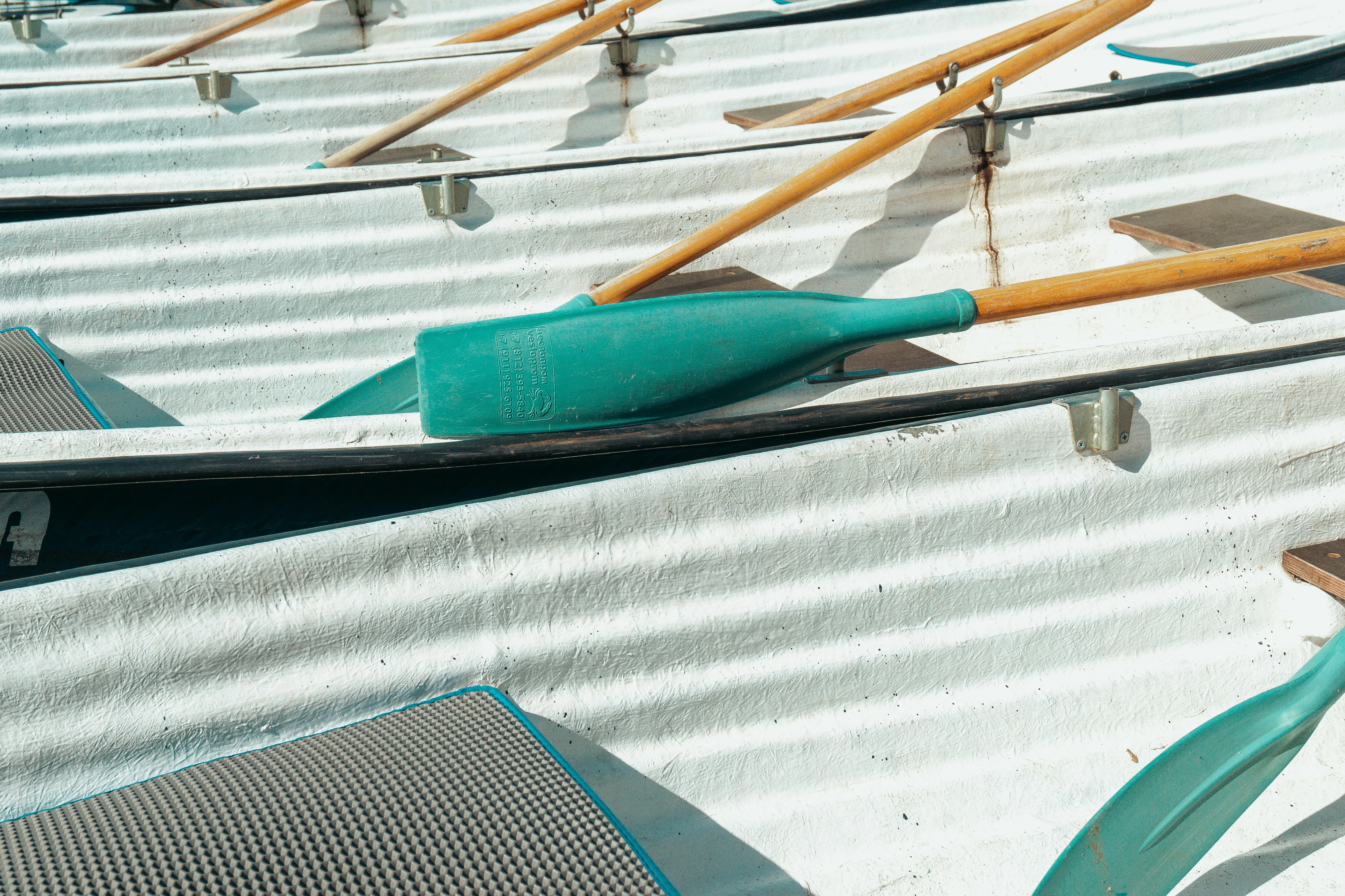 Rowing Oars Resting on Aligned Ridges