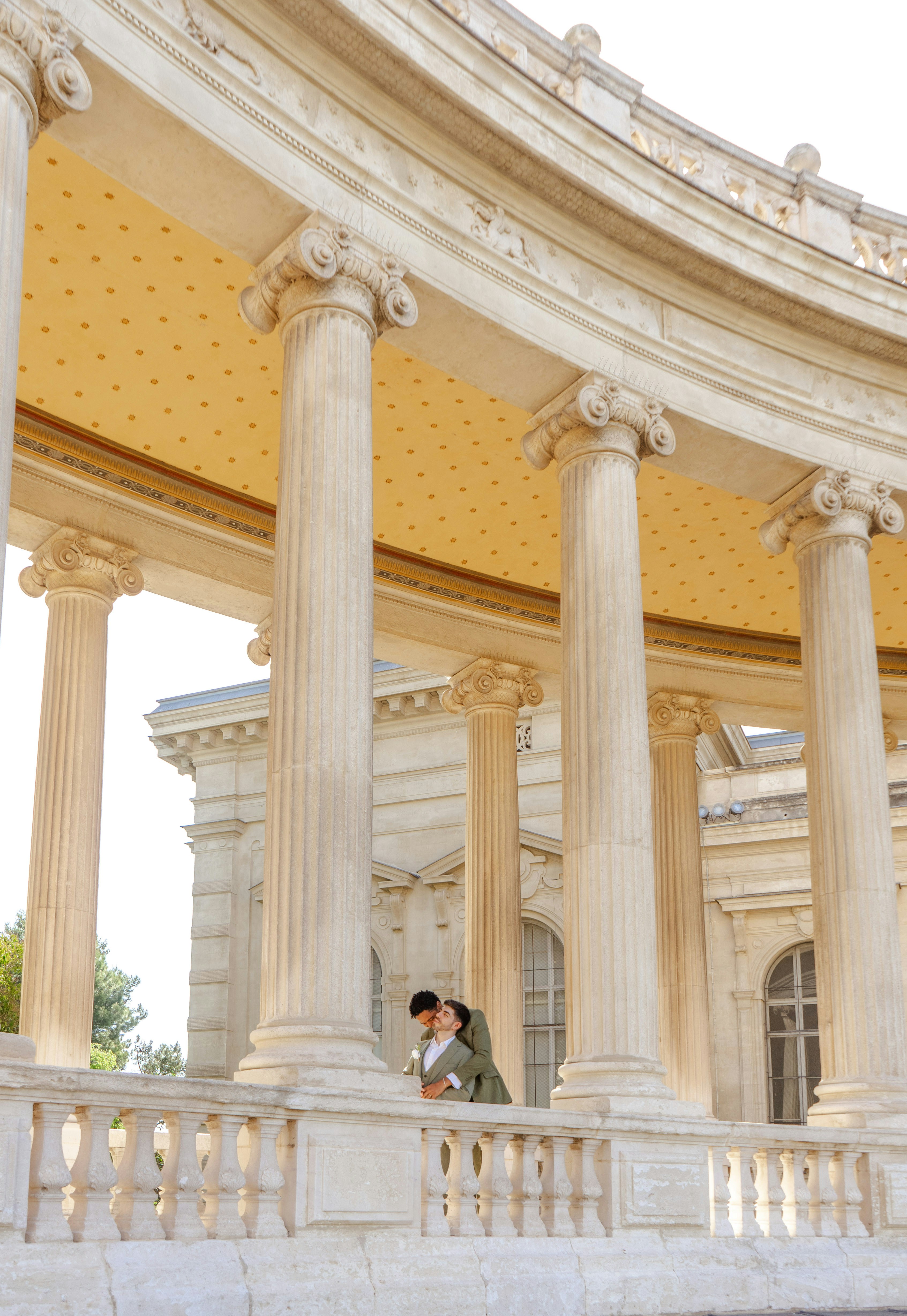 Couple in a Sunlit Classical Portico