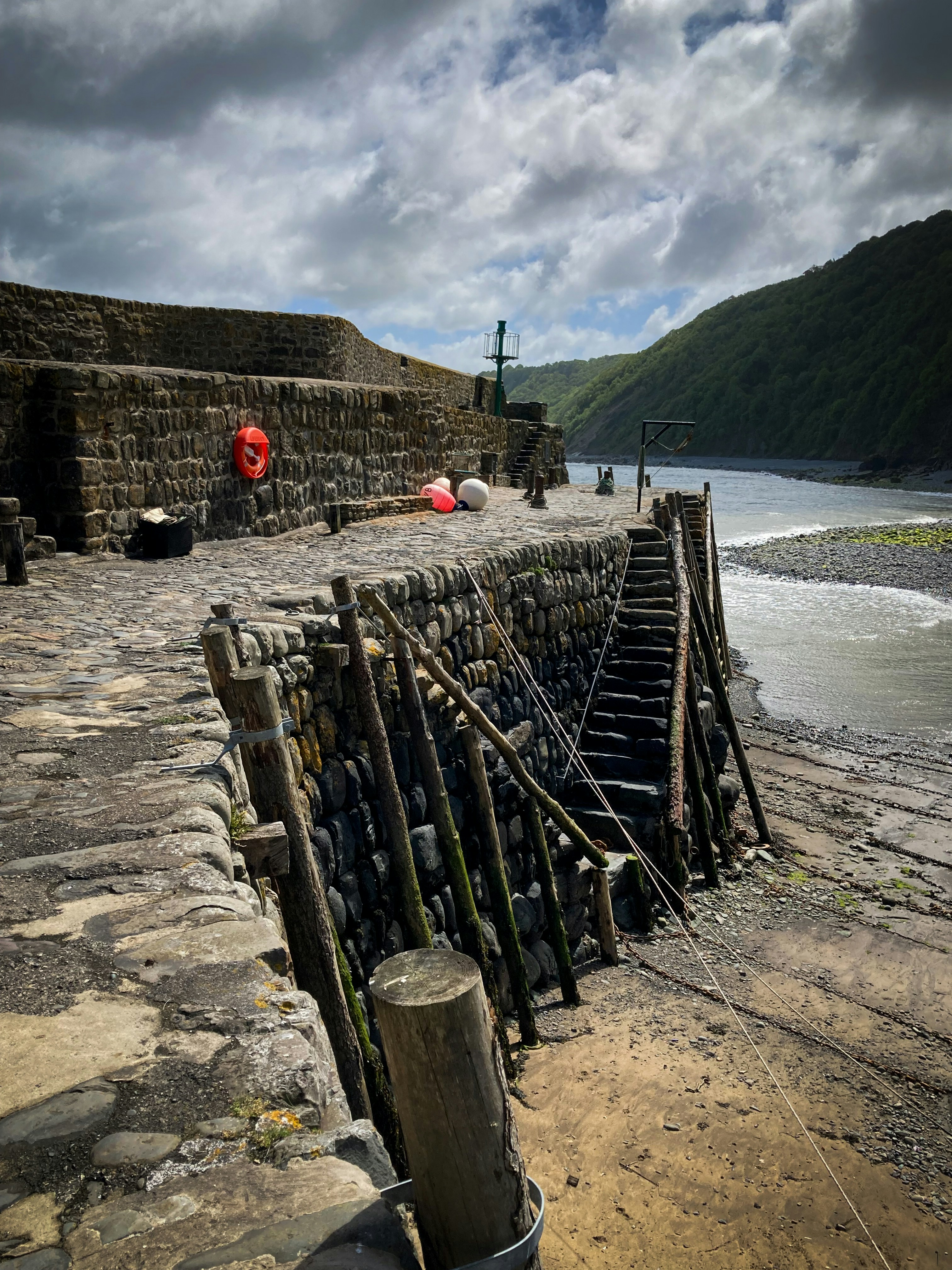 Stone Ramparts by the Sea: A Coastal Walk Along the Tide