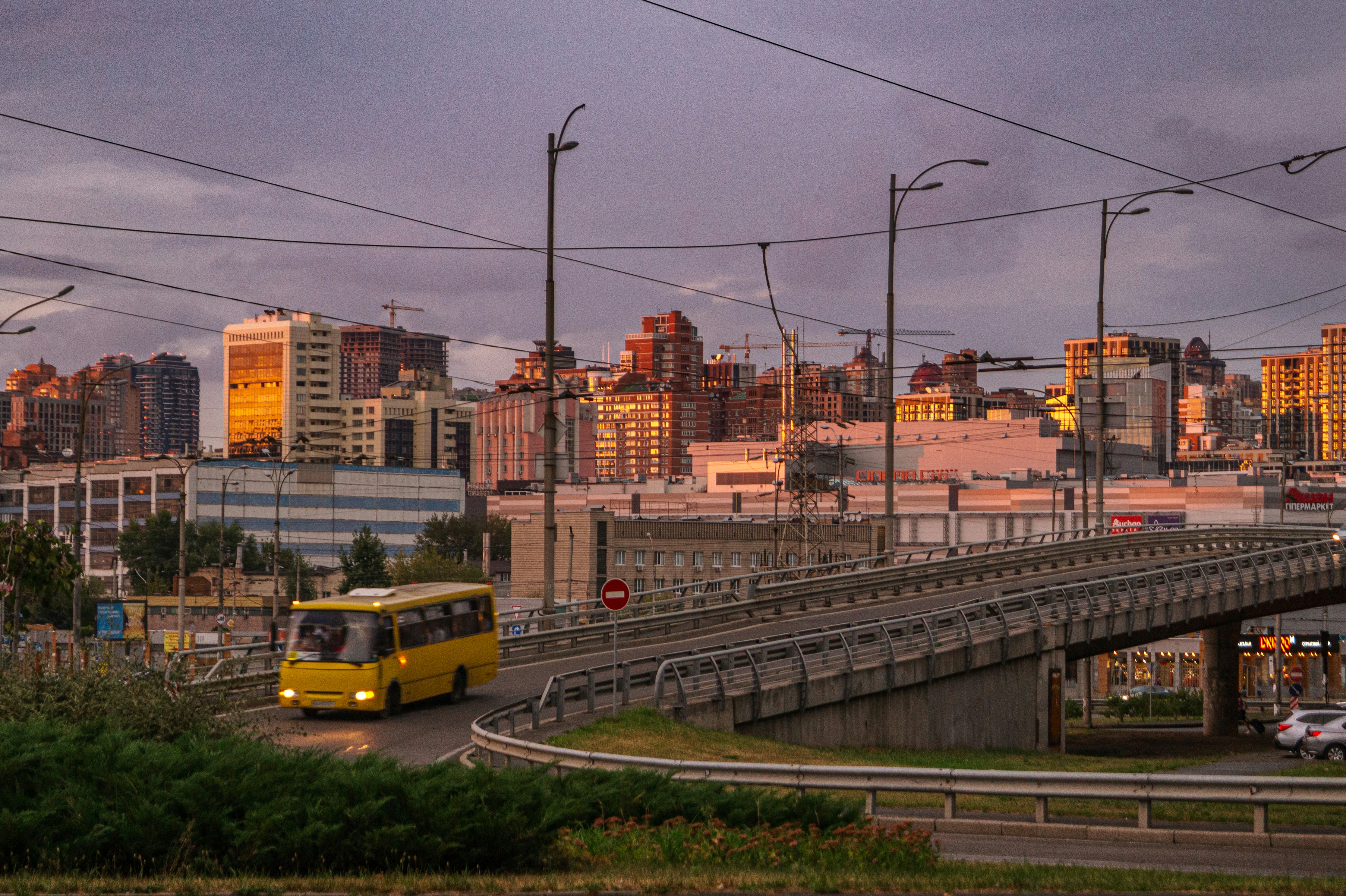 Golden Hour Overpass: A Riverside City Landscape