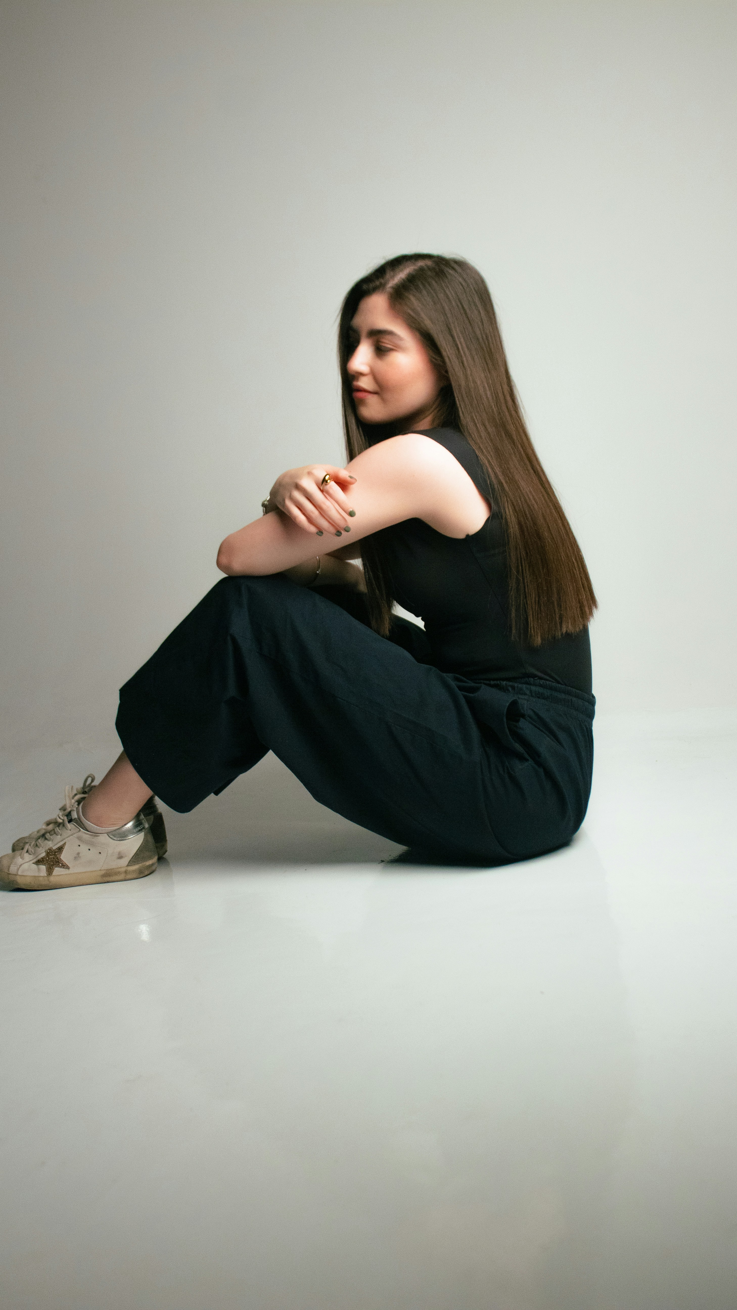 Quiet Confidence: A Portrait of Stillness in Black Attire