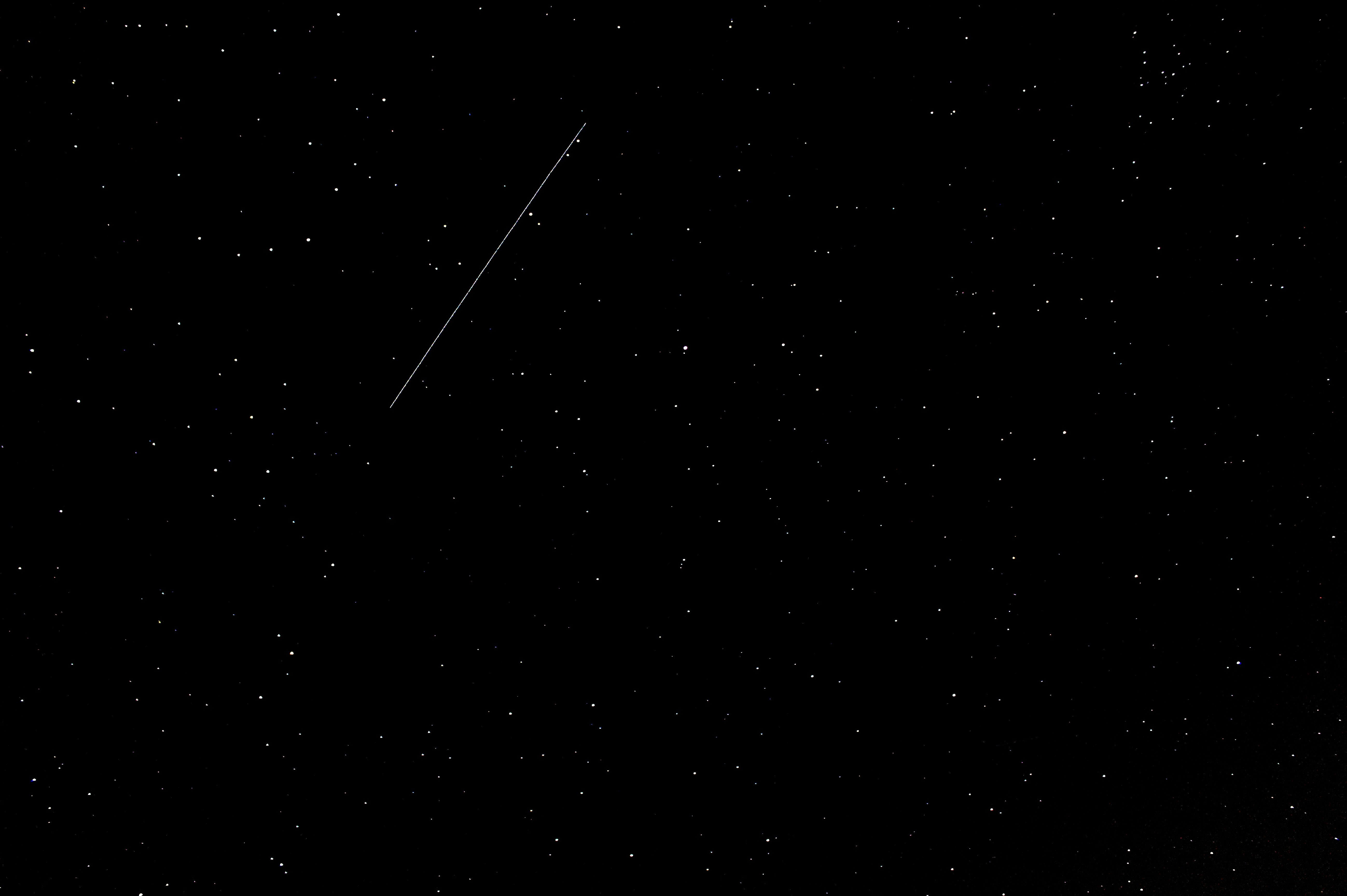 A Narrow Meteor Trail across a Starfield