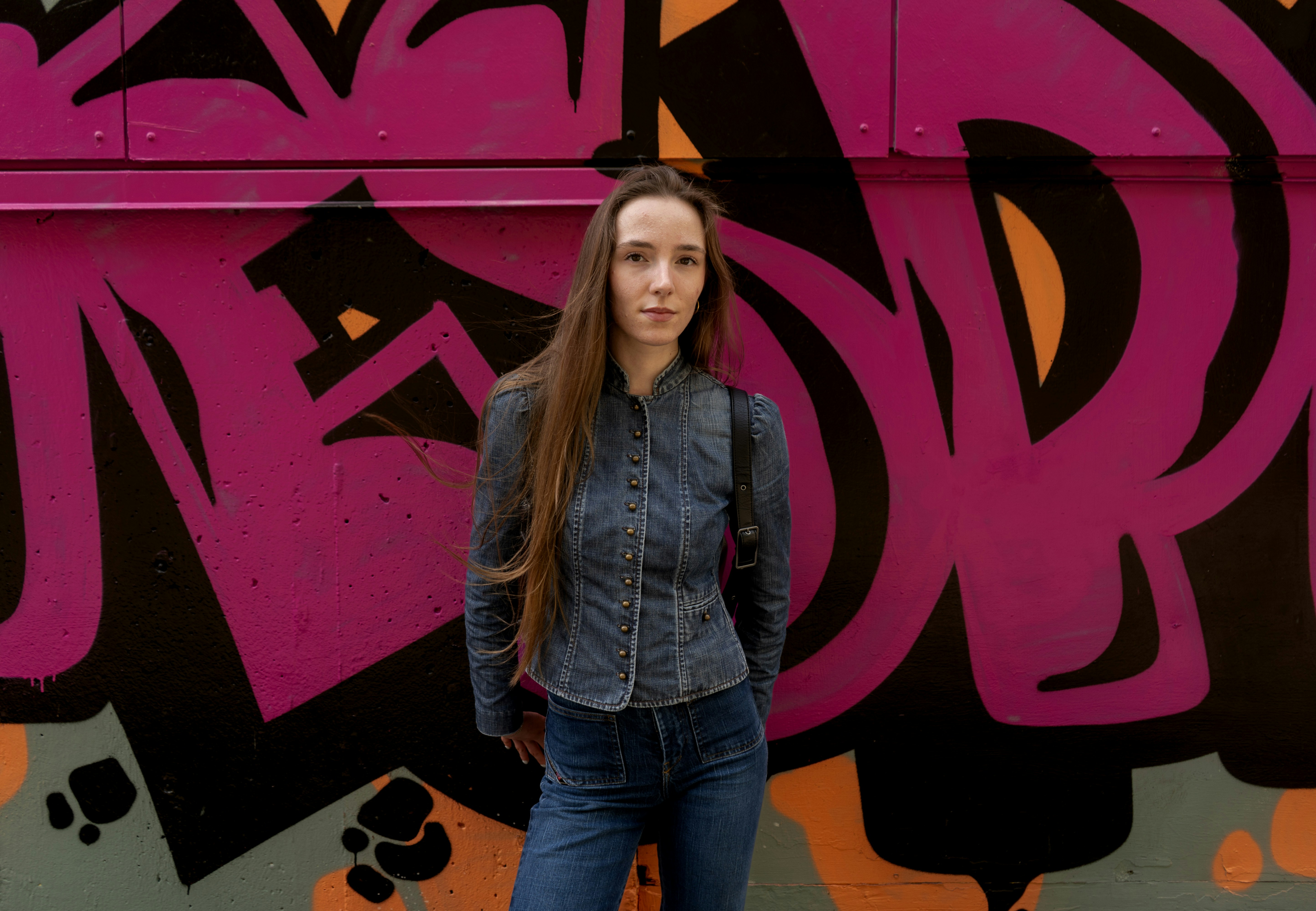 Portrait in Front of Vivid Graffiti