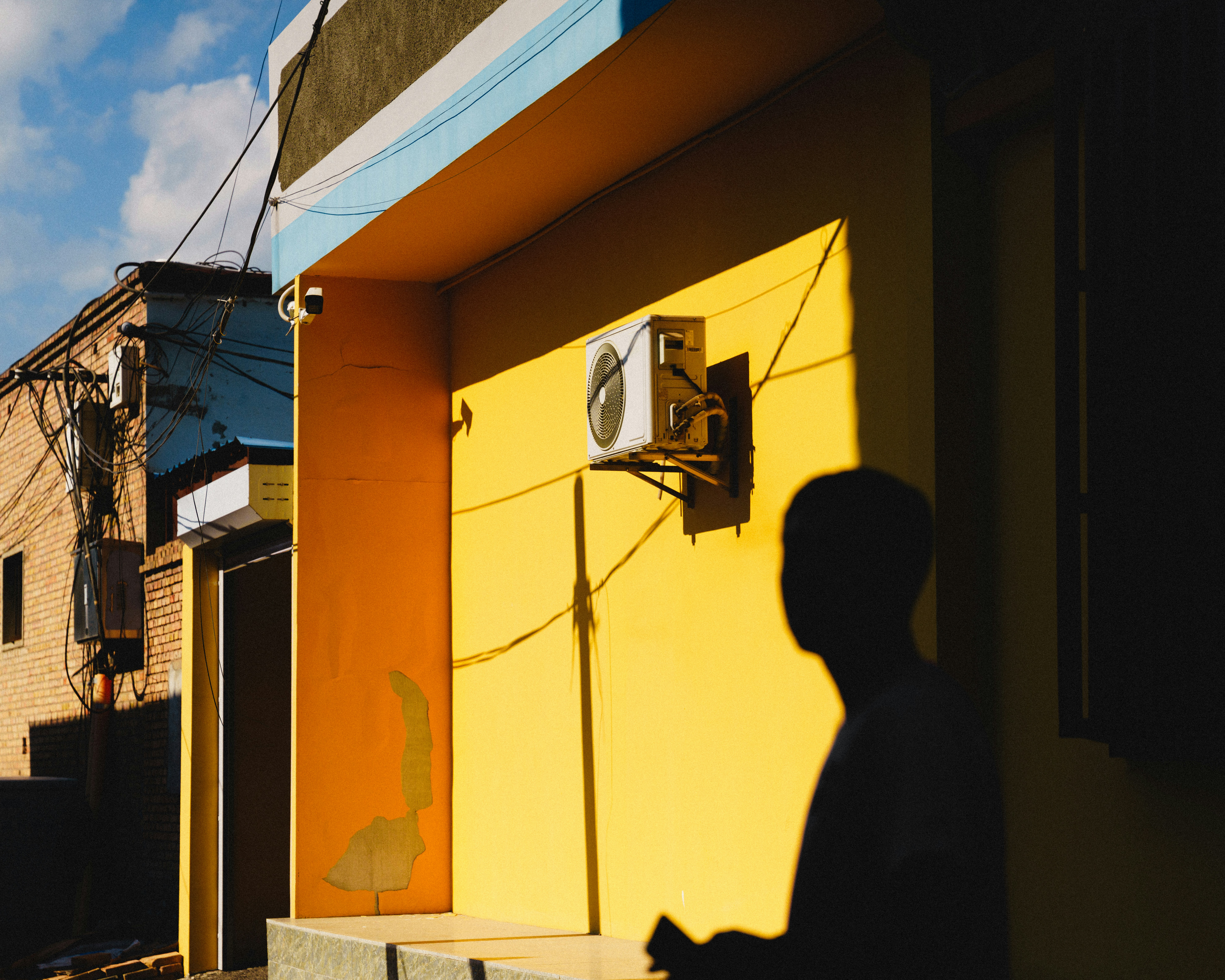 Silhouette in the Yellow Spotlight