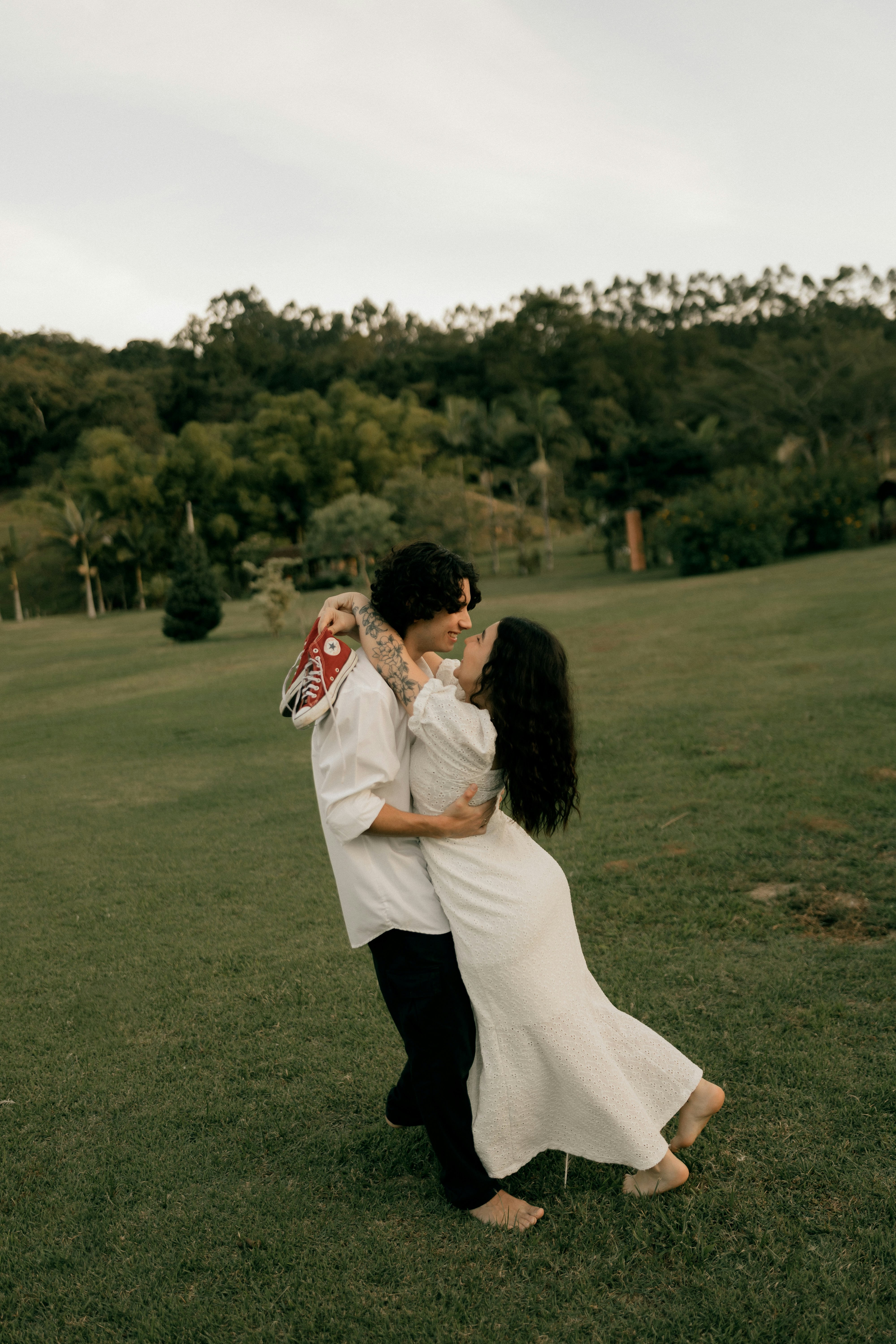 Couple’s Lift in Open Green: A Moment of Whimsy