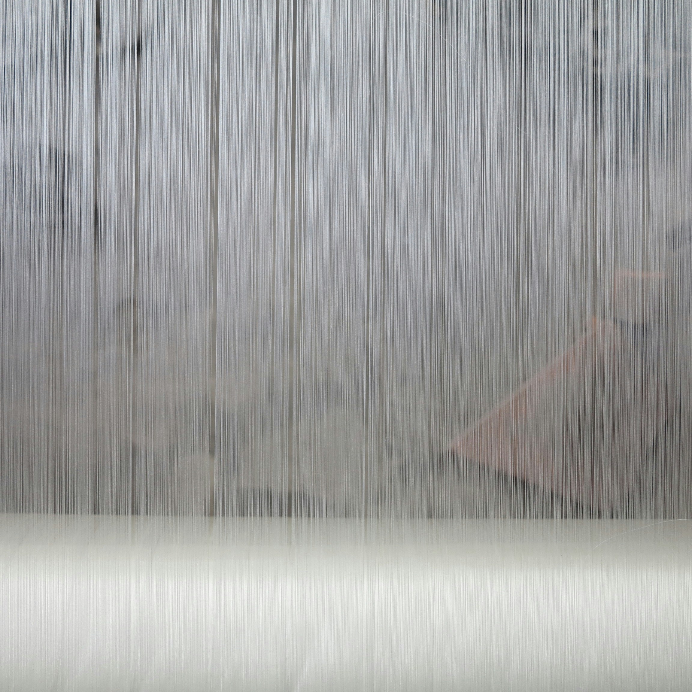 Vertical Lines Through Glass: A Blurred Corridor of Traces