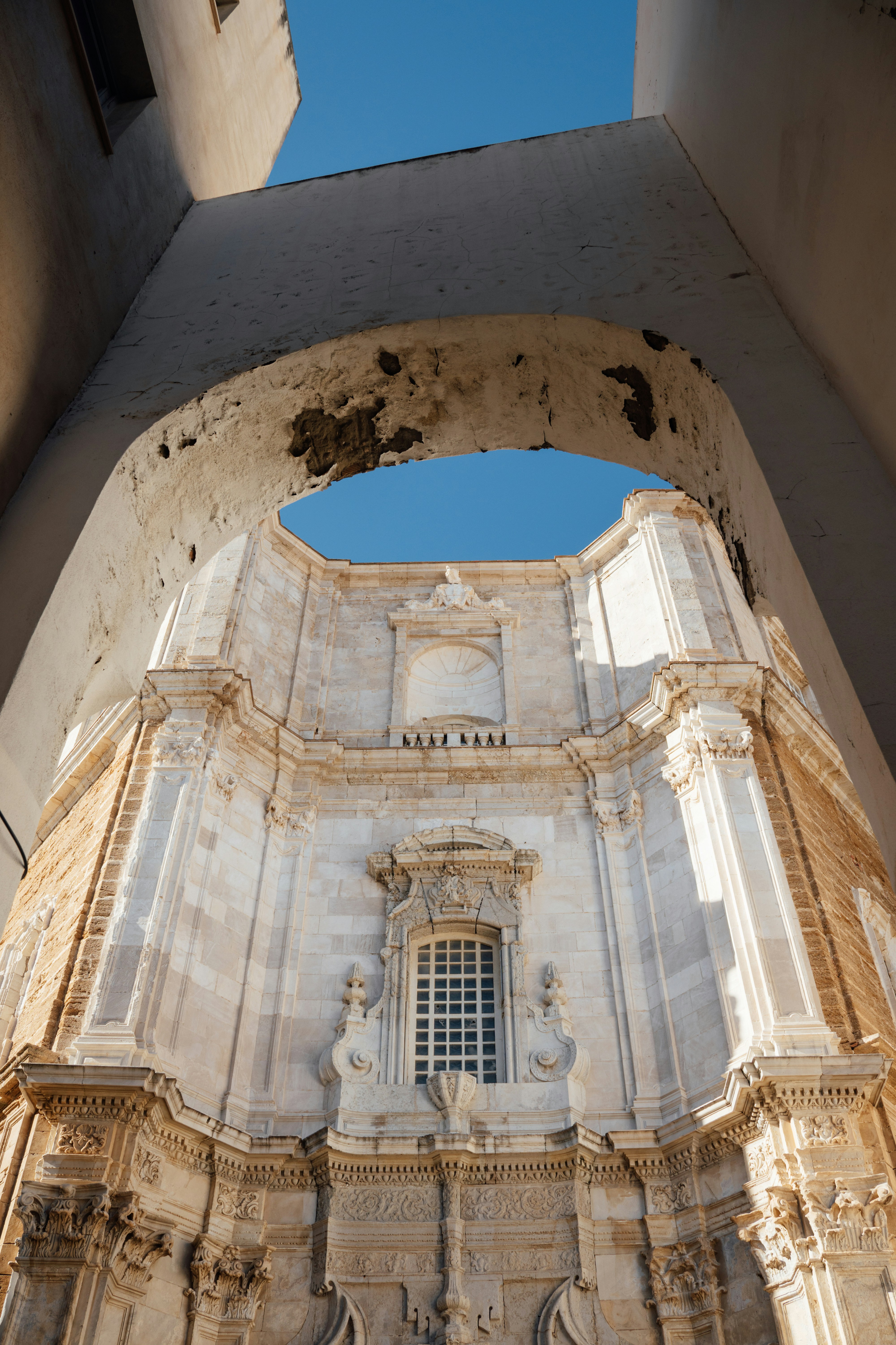 Archway Overlook: Carved Facade Framed by Sky