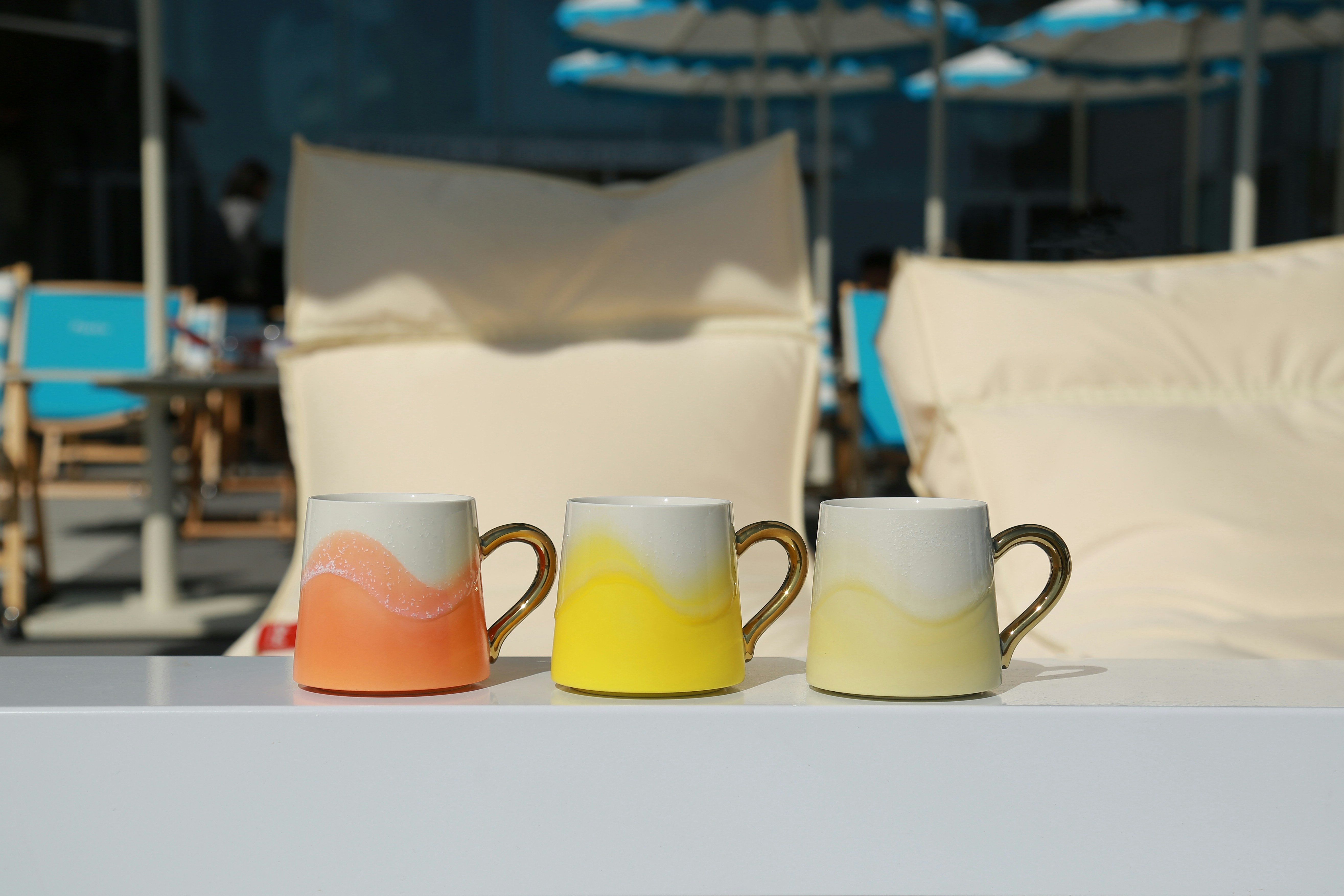 Colorful Ceramic Trio on a Sunlit Deck