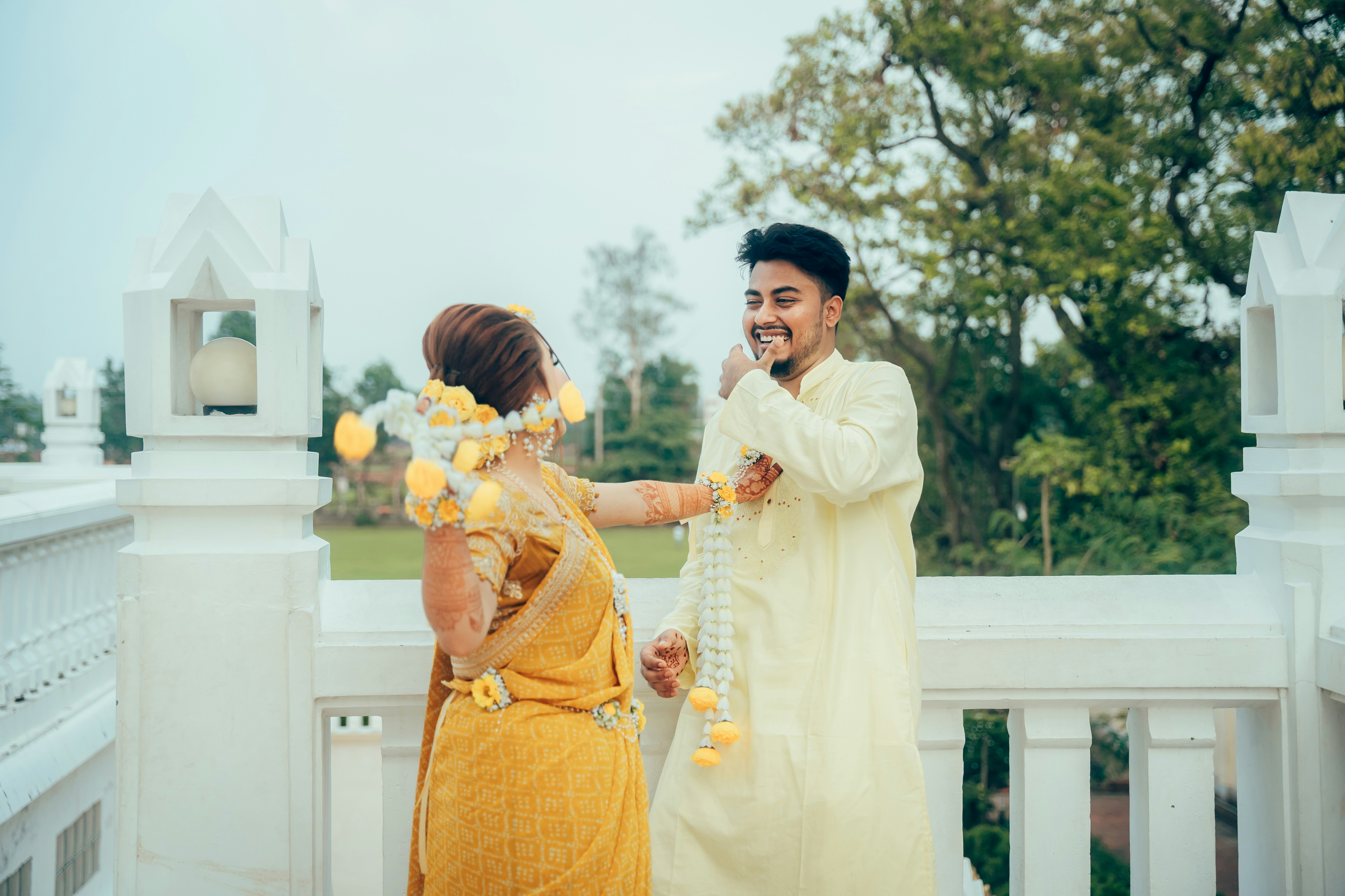 Lakshmi-Putra Union: A Sunlit Garba Porch Moment